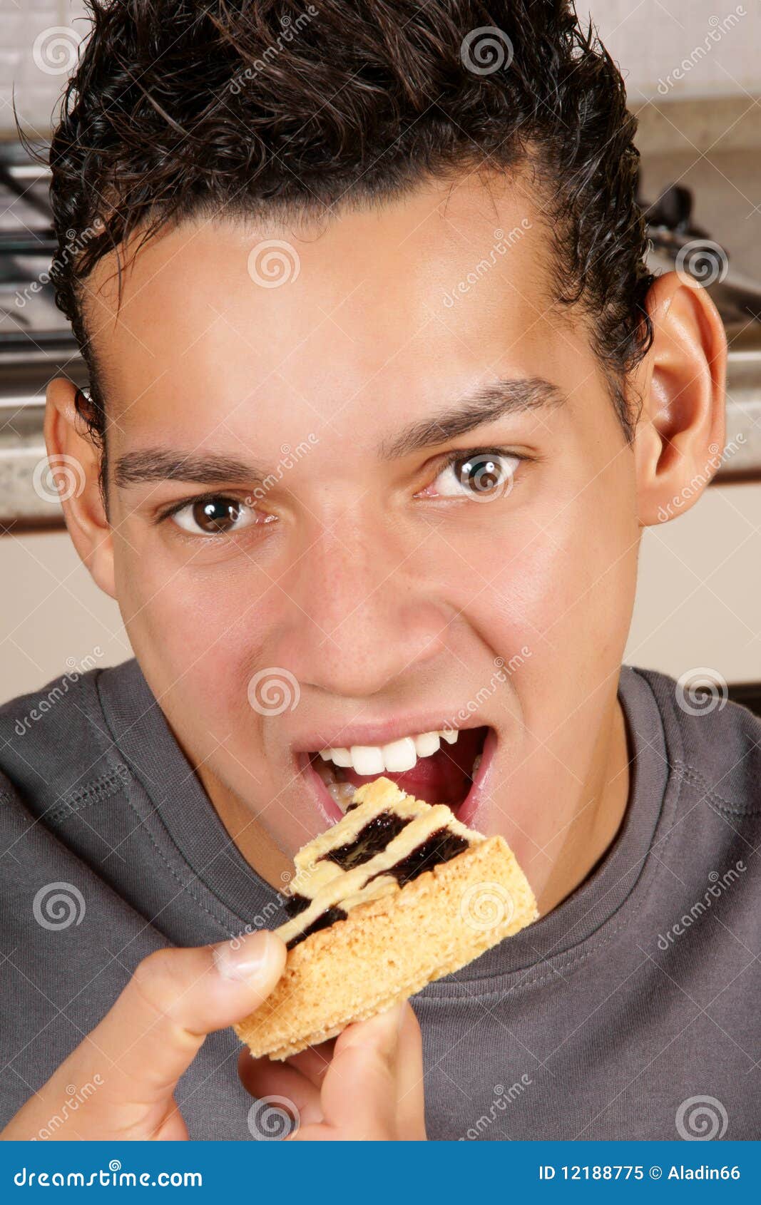 Young Man Eating Fruit Tart Stock Image - Image of adult, hispanic ...