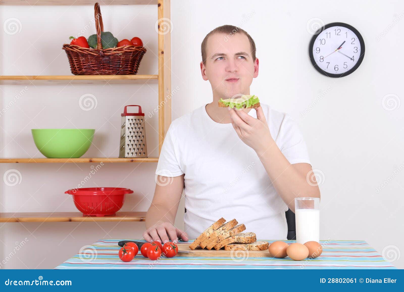 Young Man Eating in the Kitchen Stock Image - Image of lifestyle ...