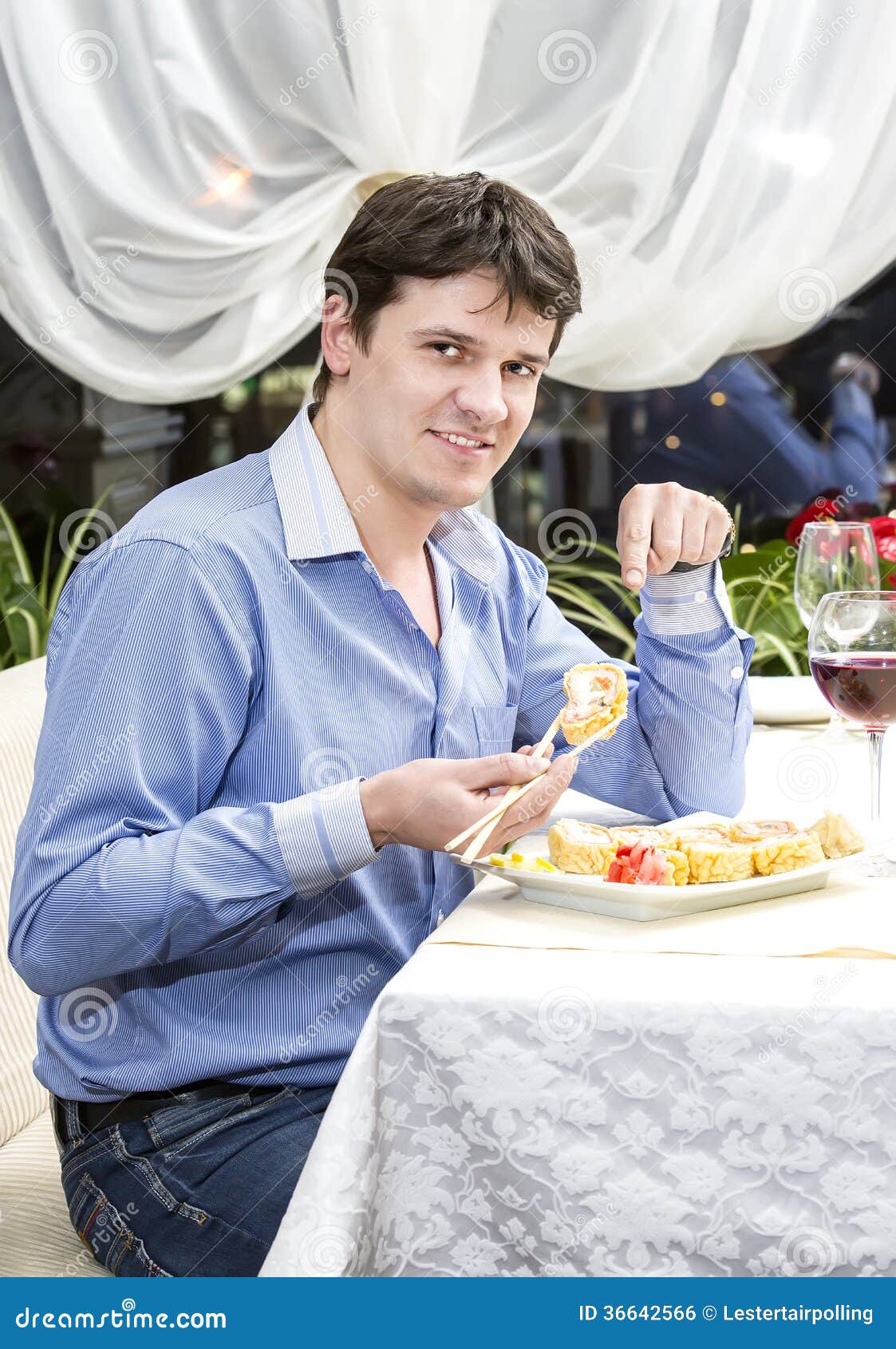 Young man eating stock photo. Image of beauty, enjoy - 36642566