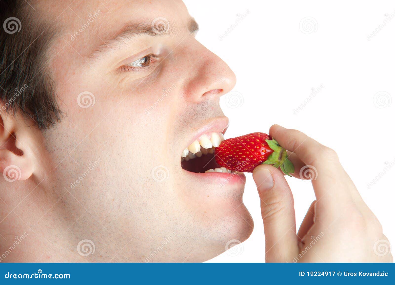 Young Man Eating Strawberry Closeup Stock Image - Image of closeup ...