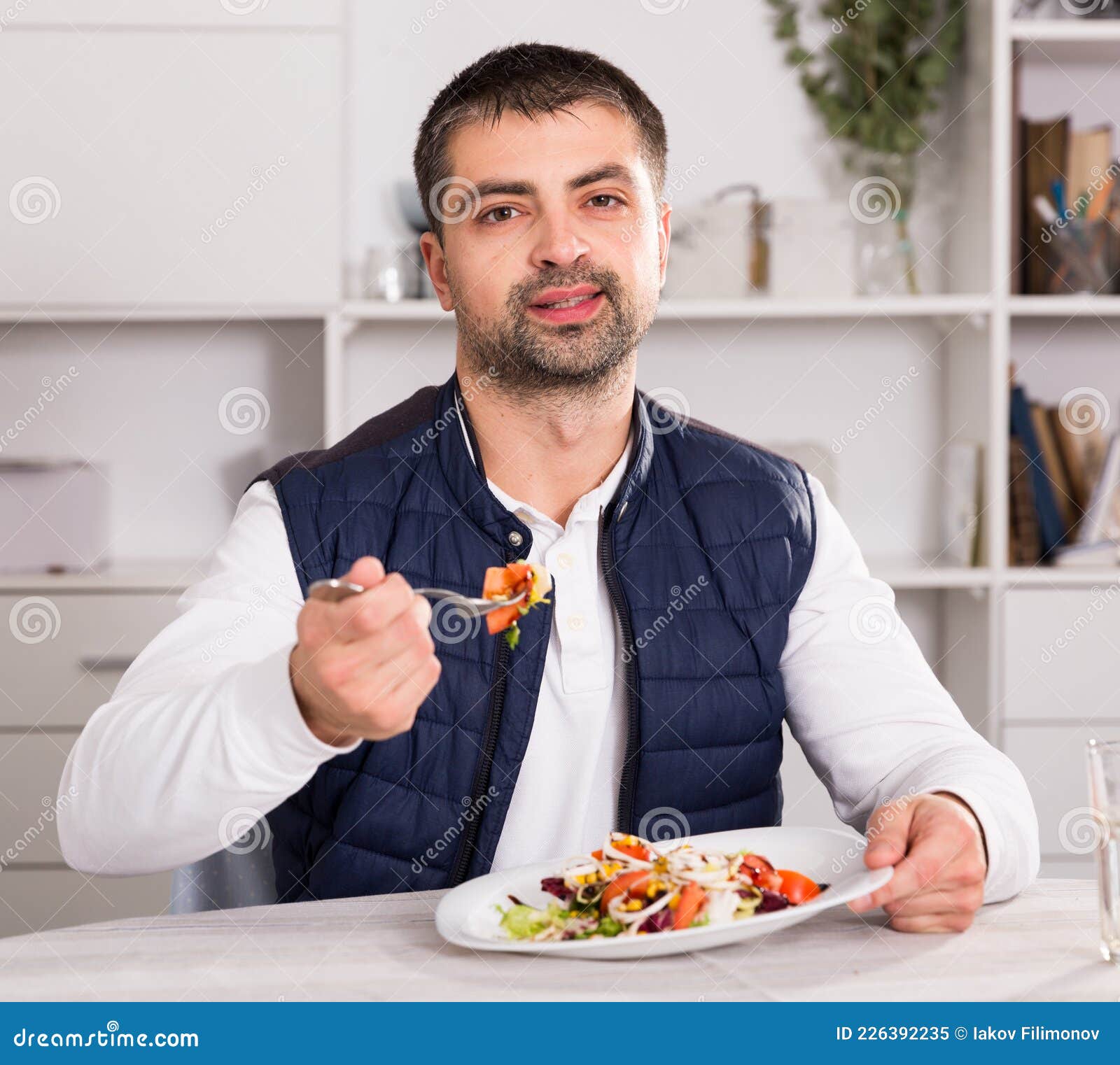 Young Man Eating Vegetable Salad from Plato Stock Image - Image of ...