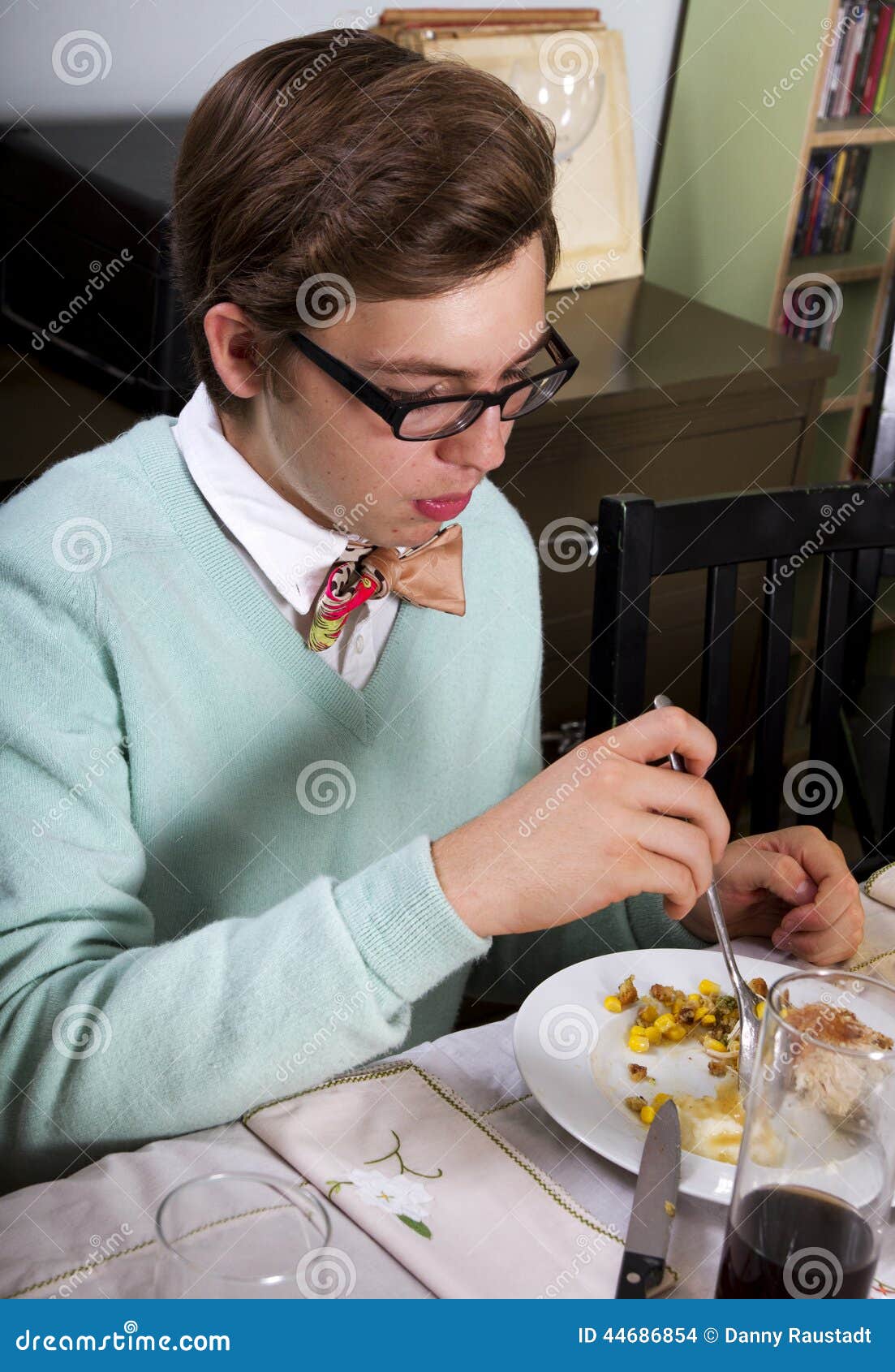 Young Man Eats Thanksgiving Dinner Turkey Stock Photo - Image of feeds ...