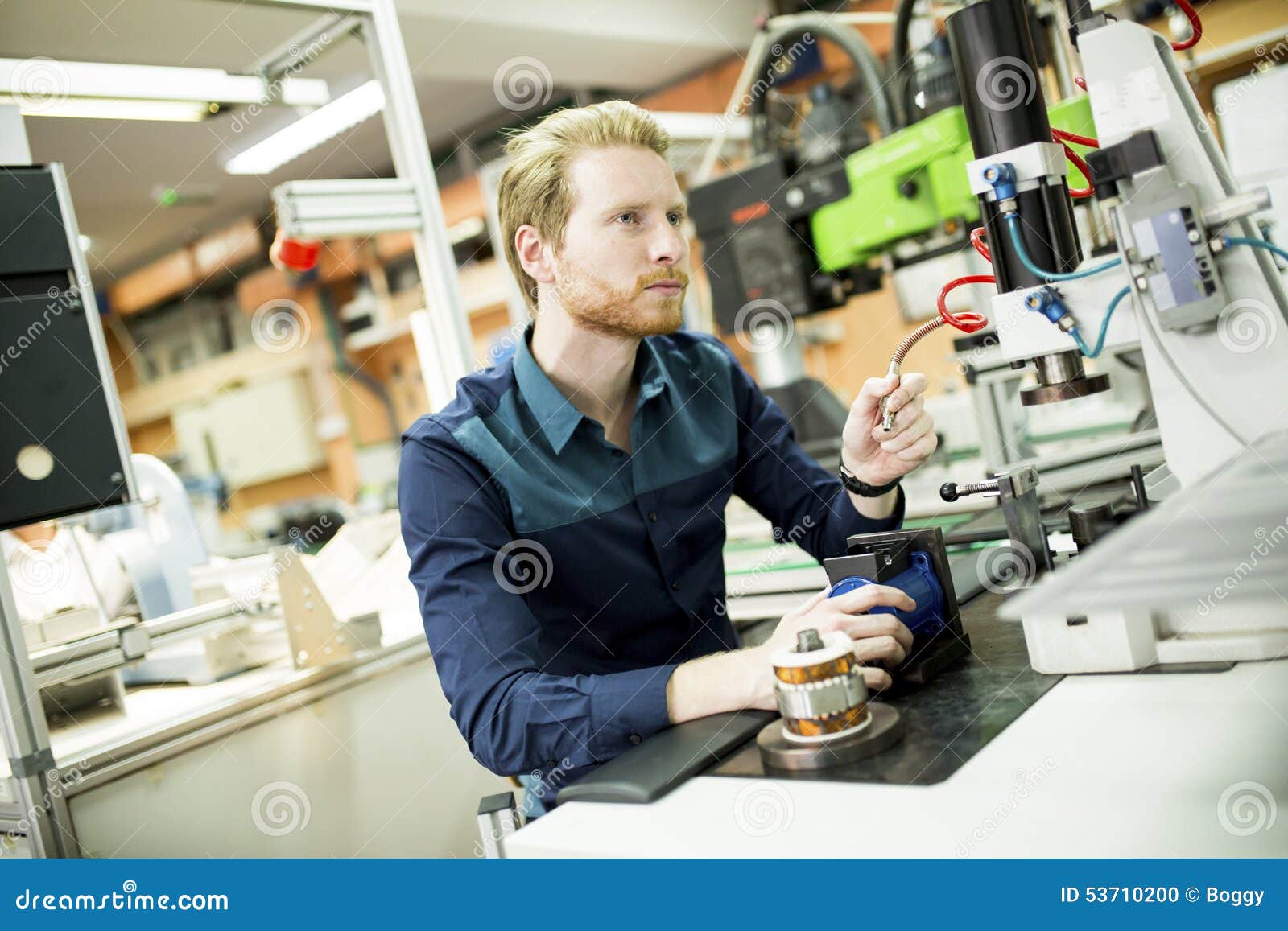 Young Man in Electronics Workshop Stock Photo - Image of technology ...