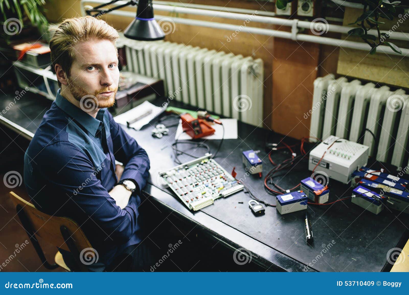 Young Man in Electronics Workshop Stock Image - Image of activity ...