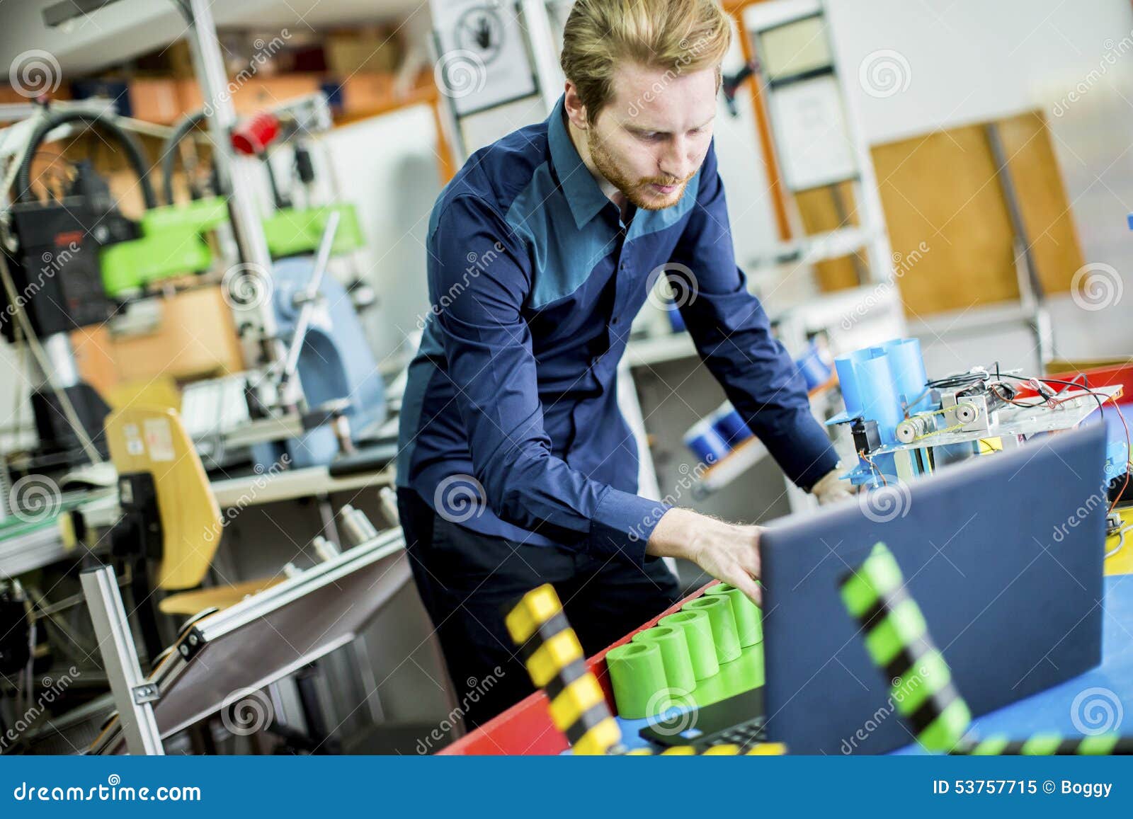Young Man in Electronics Workshop Stock Image - Image of electricity ...