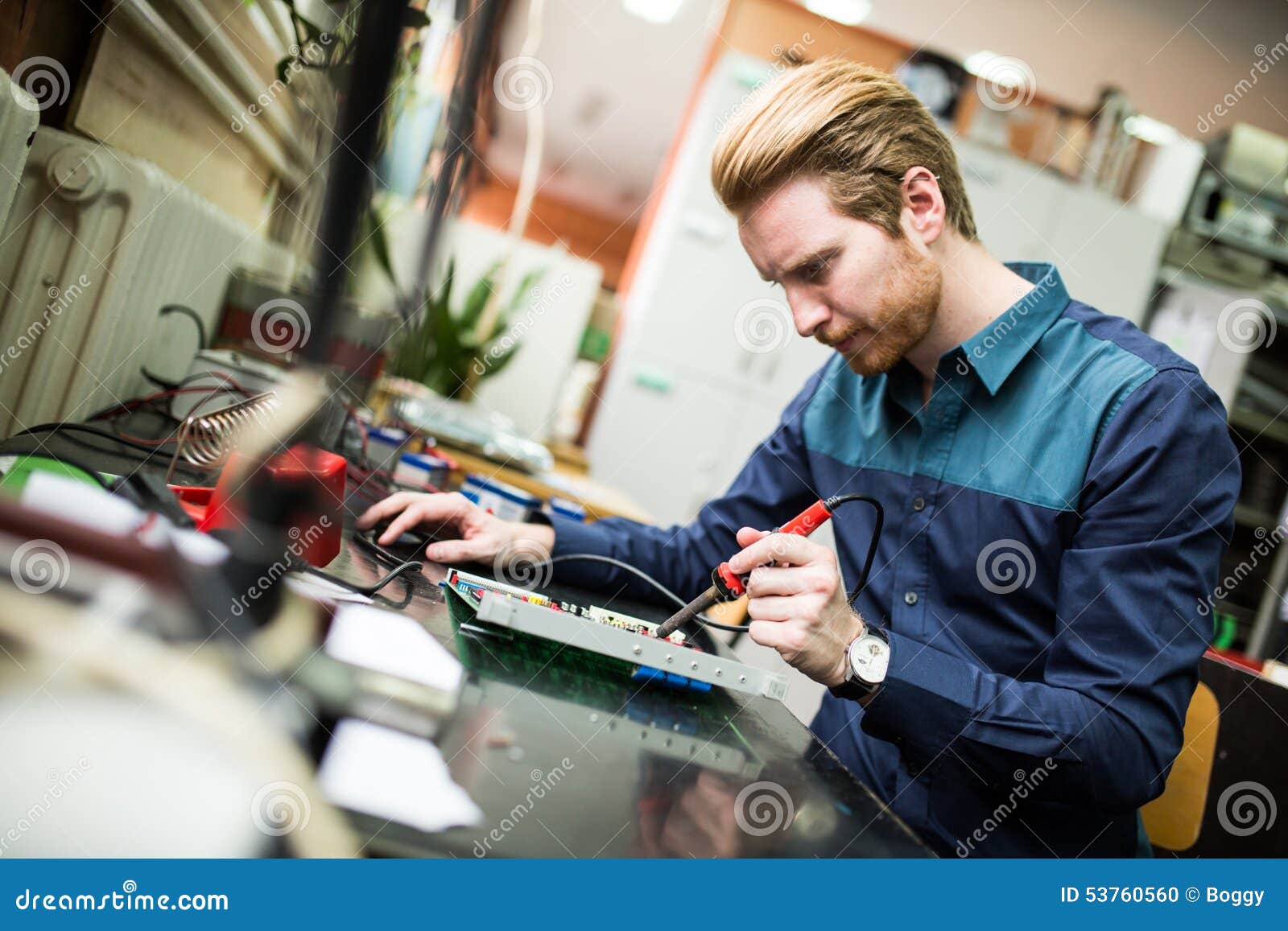 Young Man in Electronics Workshop Stock Photo - Image of adult ...