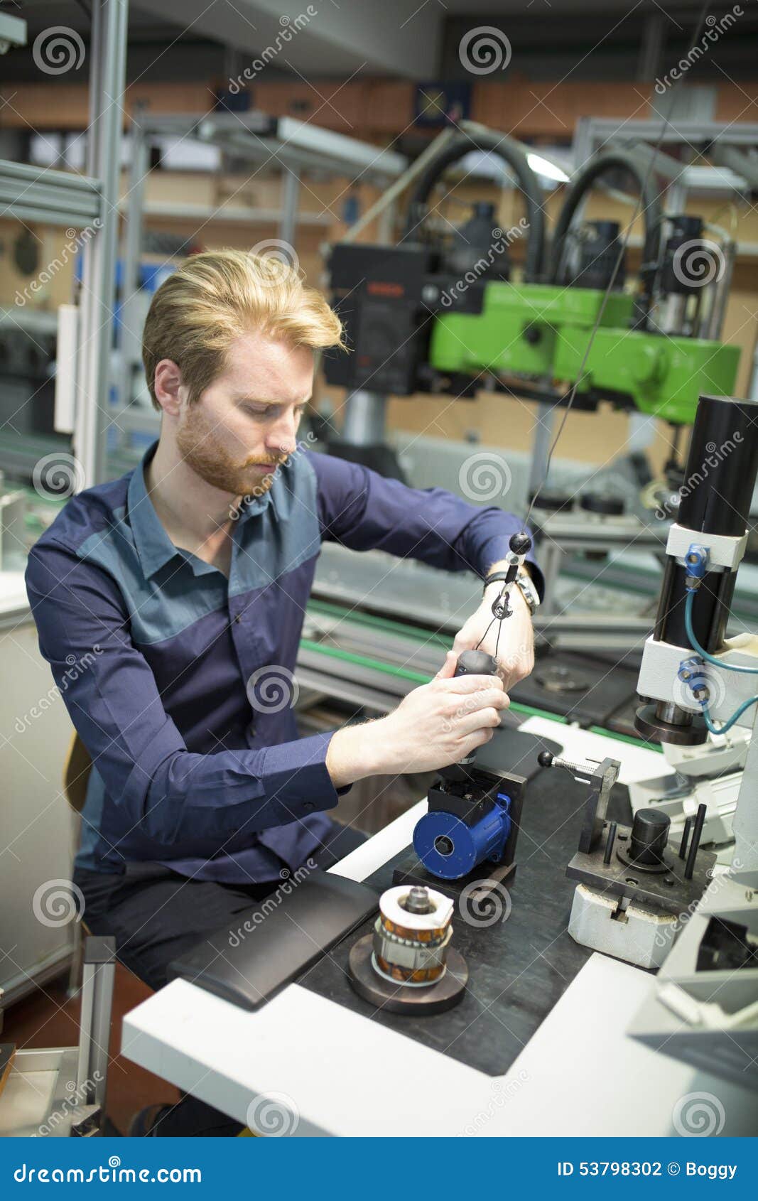 Young Man in Electronics Workshop Stock Photo - Image of technician ...
