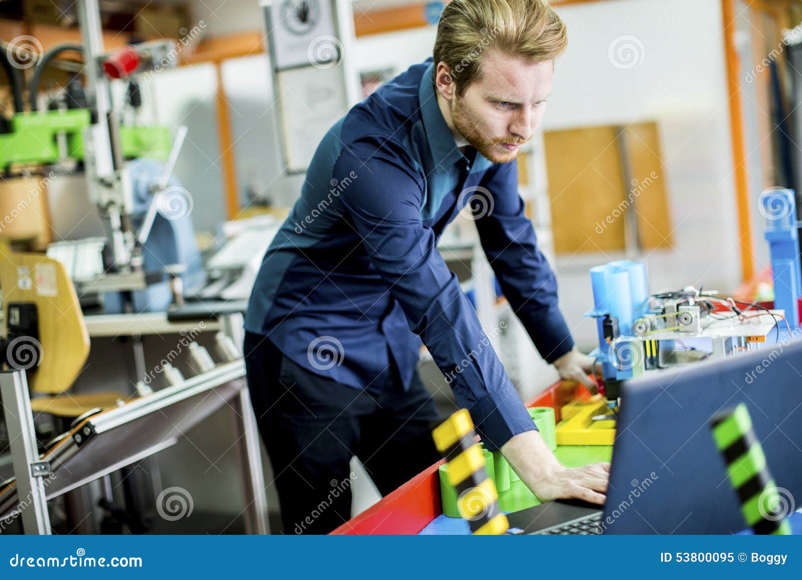 Young Man in Electronics Workshop Stock Image - Image of electricity ...