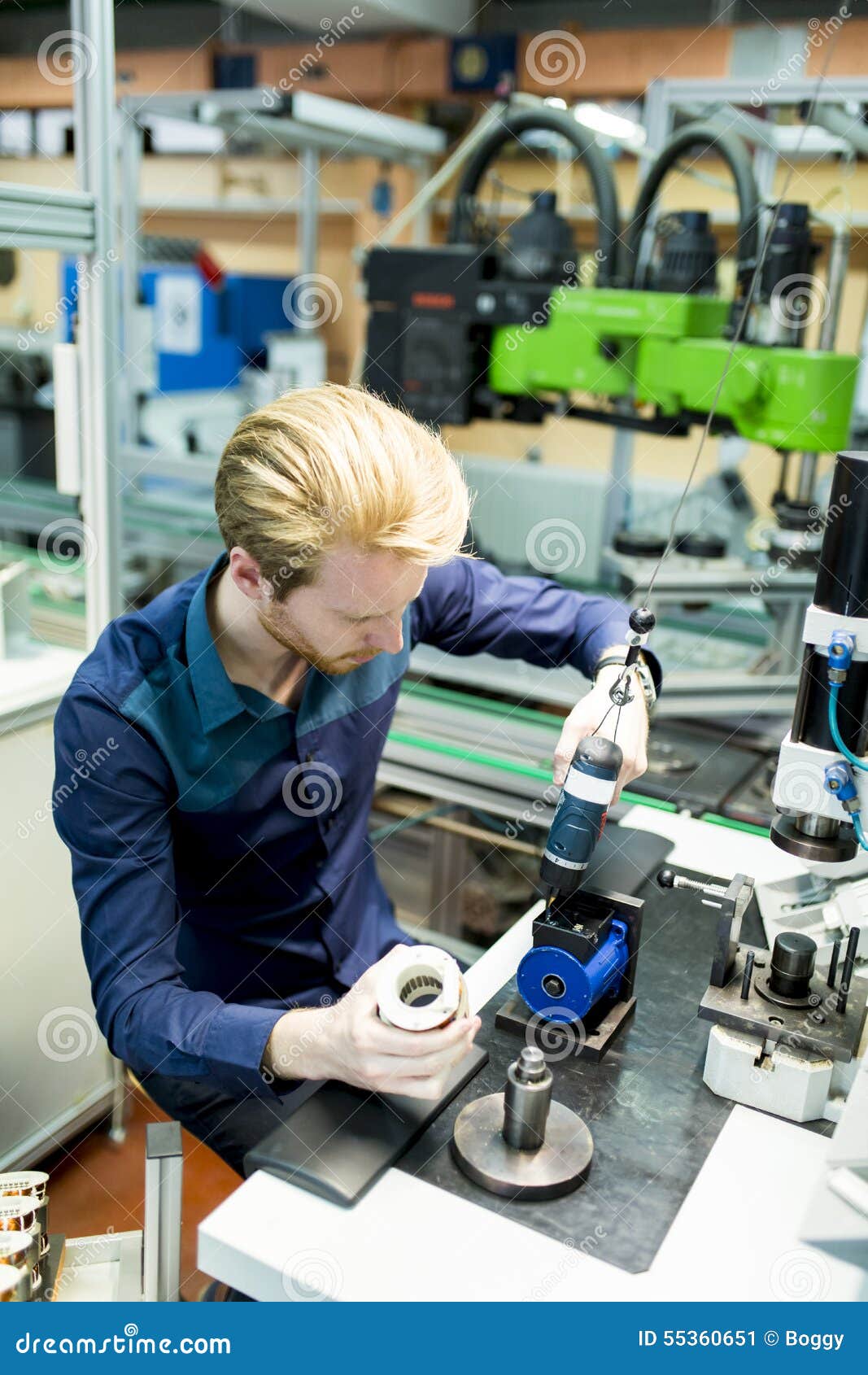 Young Man in Electronics Workshop Stock Image - Image of equipment ...