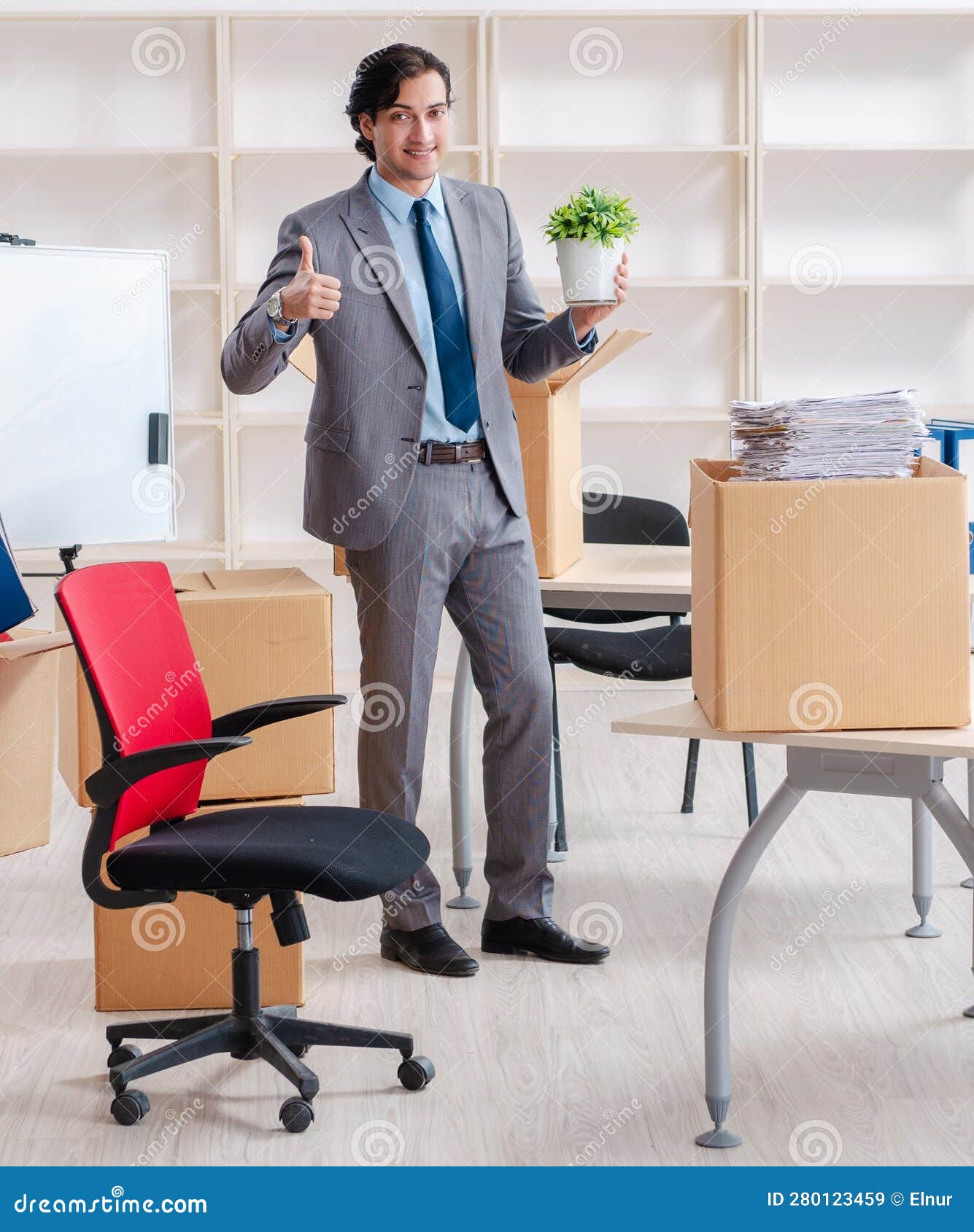 Young Man Employee with Boxes in the Office Stock Image - Image of ...