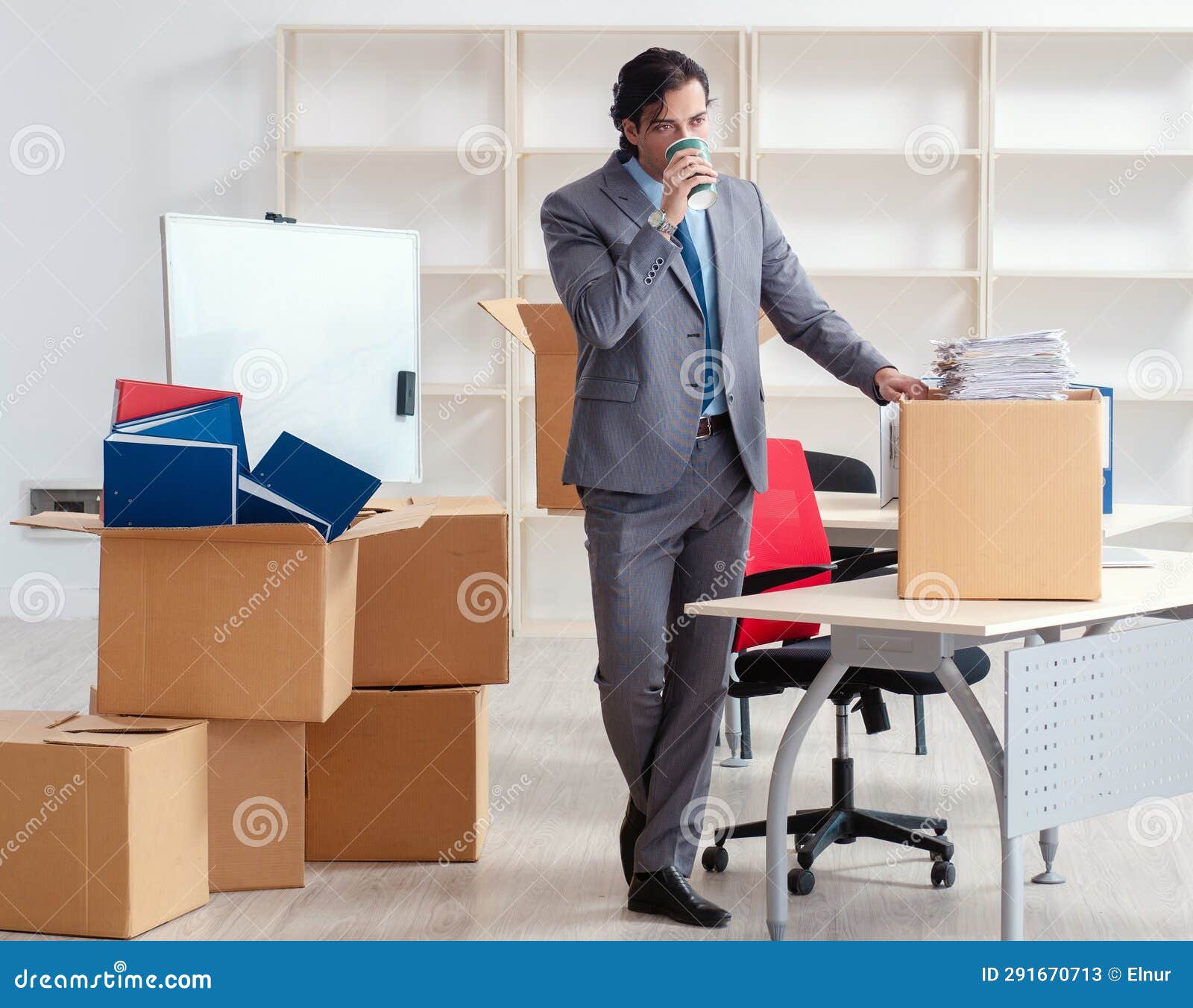 Young Man Employee with Boxes in the Office Stock Image - Image of ...
