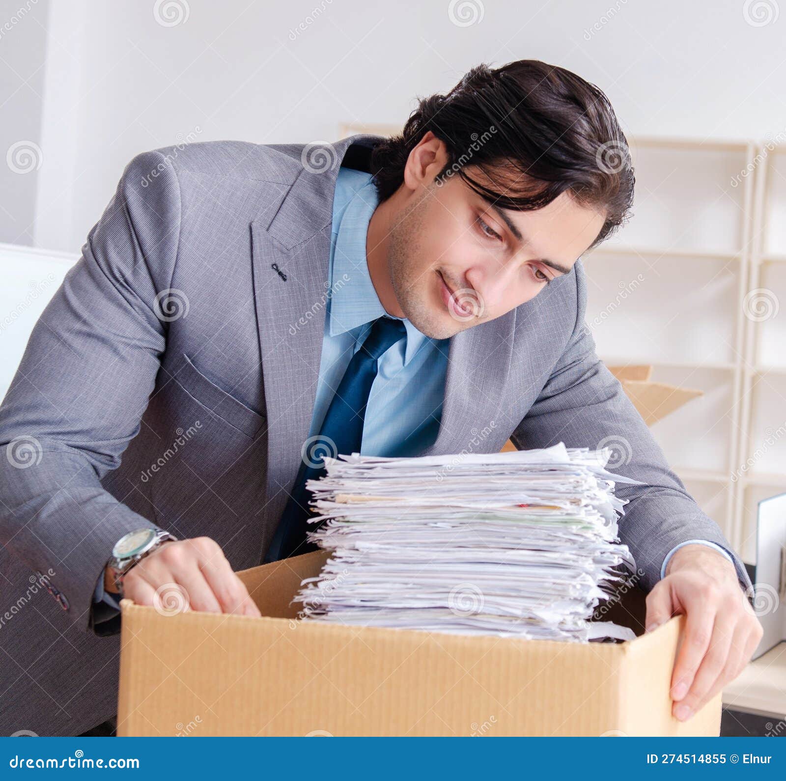 Young Man Employee with Boxes in the Office Stock Image - Image of ...