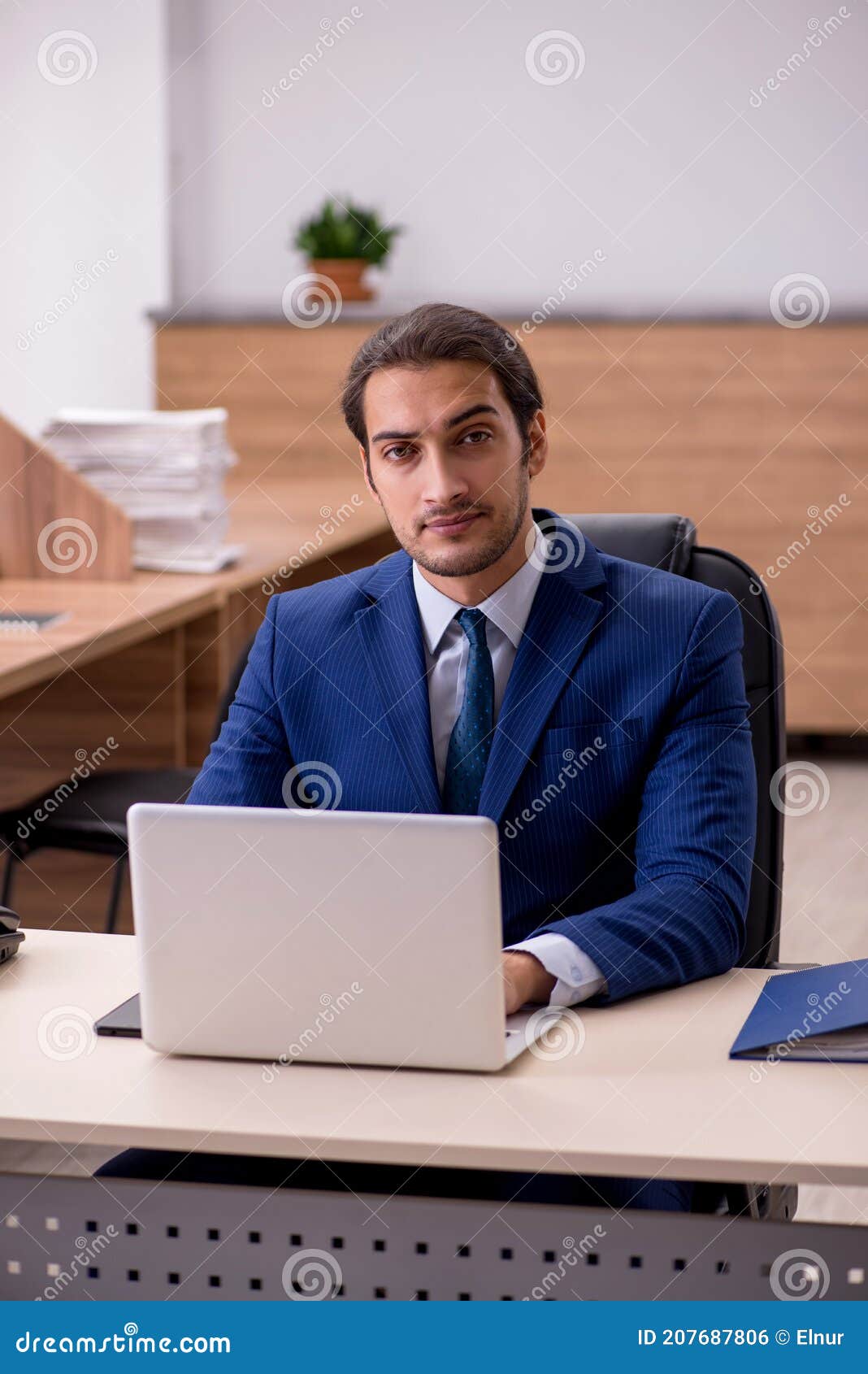 Young Man Employee Sitting at Workplace Stock Photo - Image of overtime ...