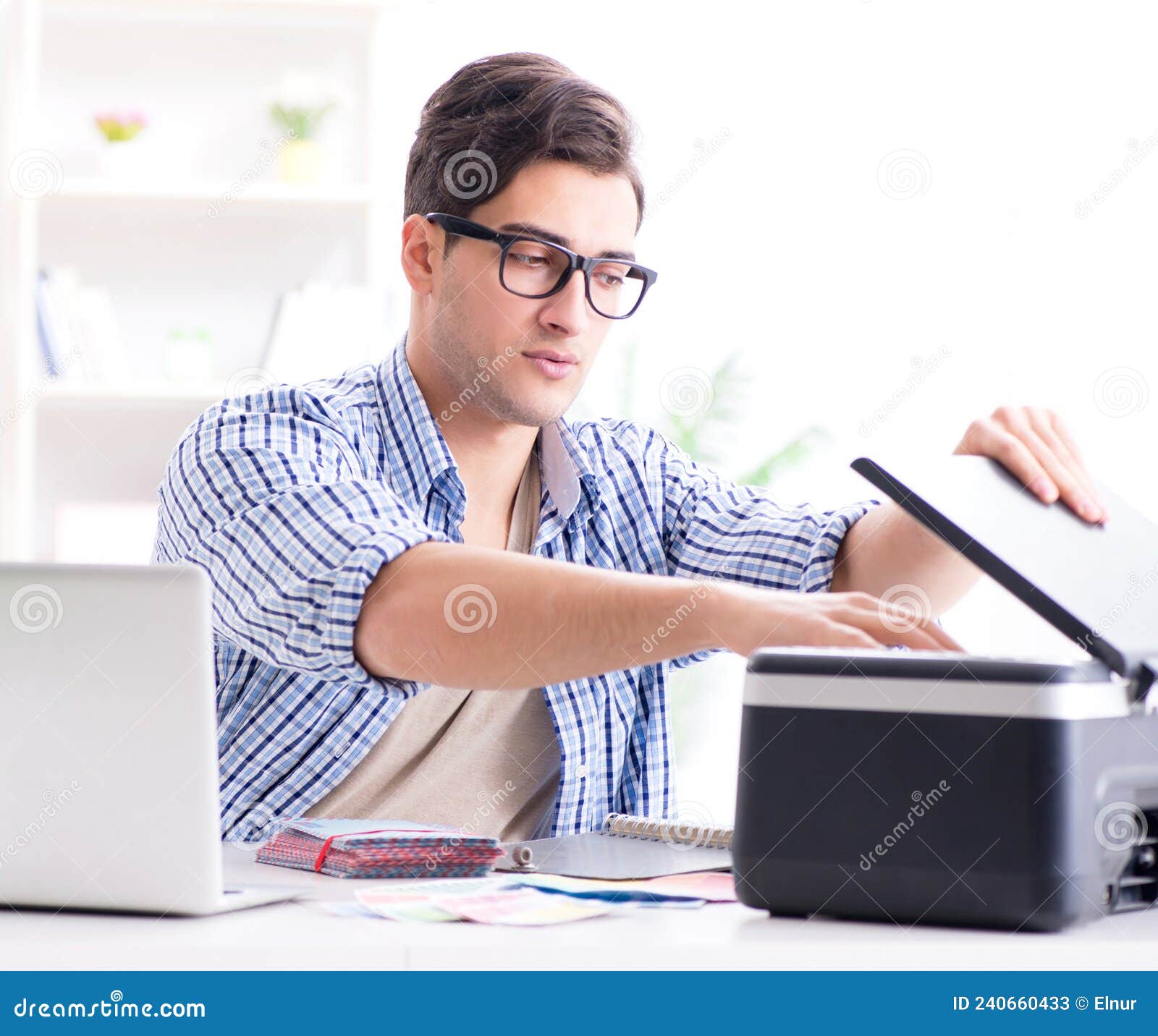 Young Man Employee Working at Copying Machine in the Office Stock Image ...