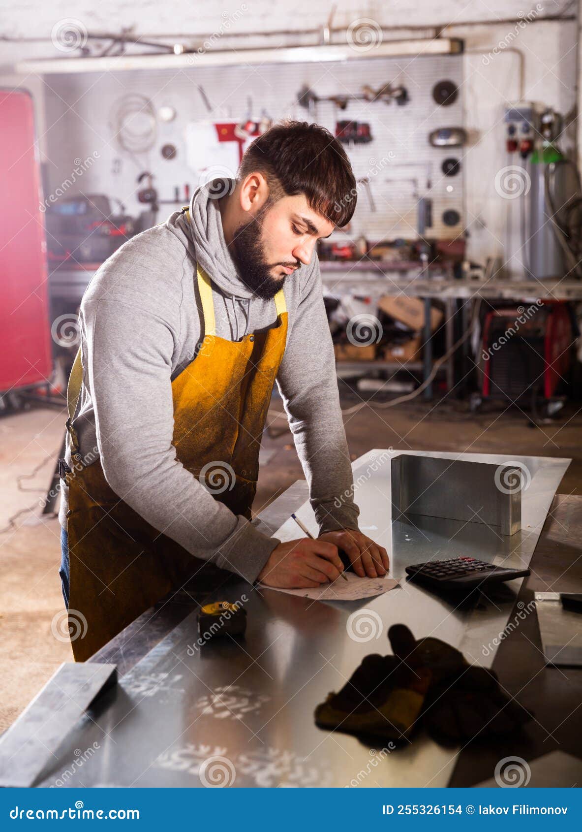 Young Man Engineer Calculation Size of Material Stock Photo - Image of ...