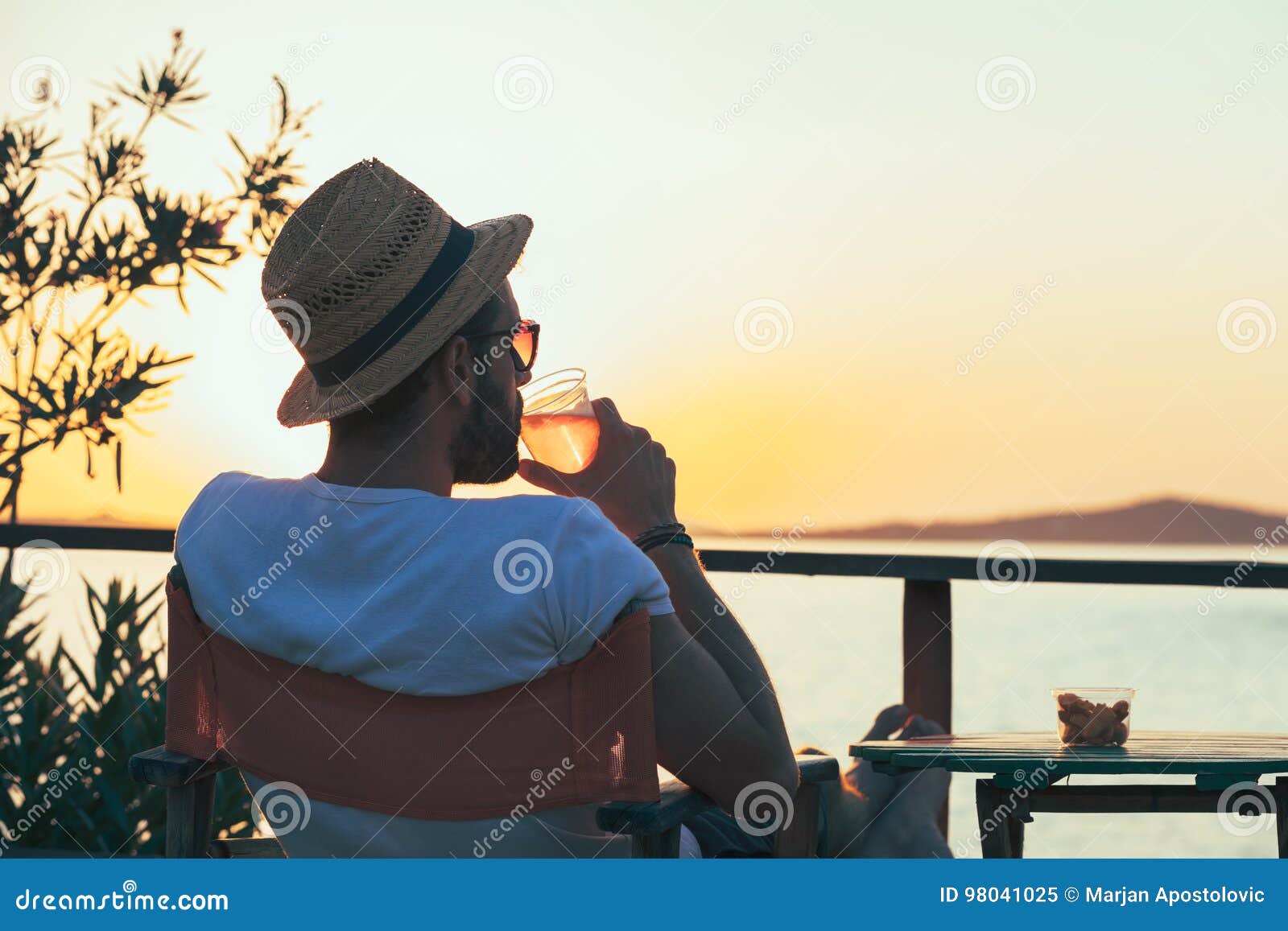 Young Man Enjoying at a Beach Bar Stock Image - Image of leisure ...