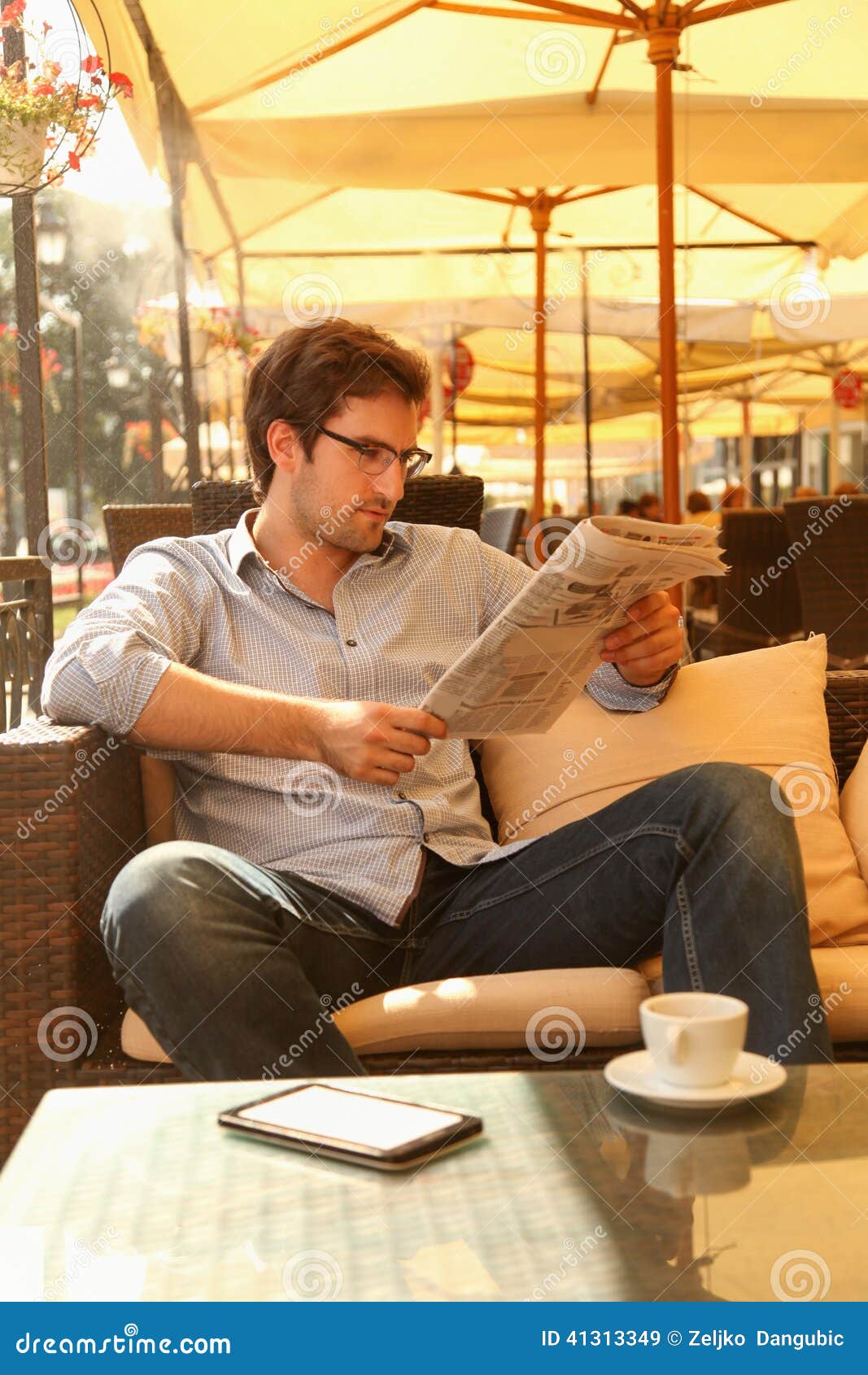 Young man enjoying in cafe stock image. Image of adult - 41313349