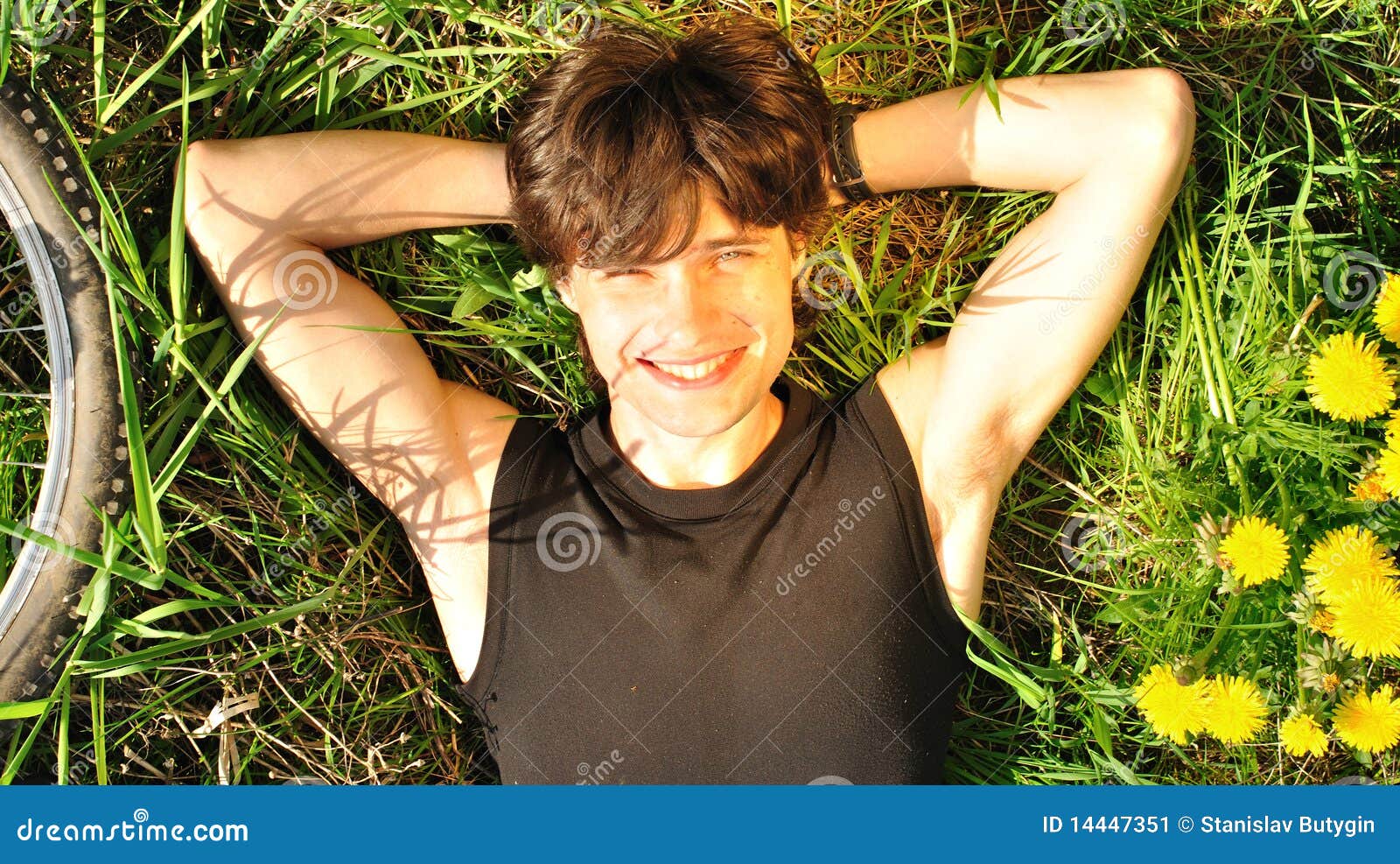 Young man enjoying life stock image. Image of wheel, smiling - 14447351