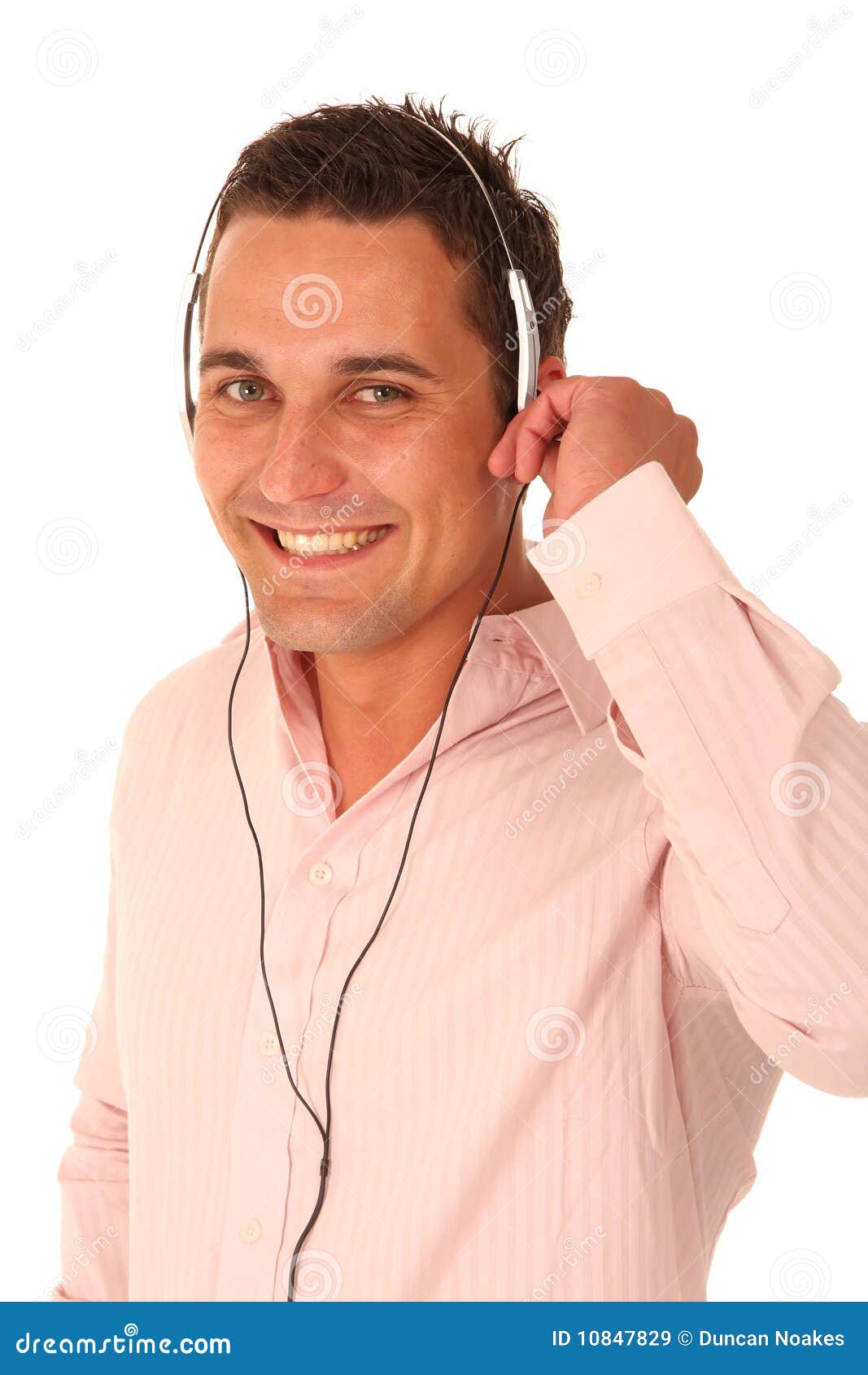Young Man Enjoying Music stock image. Image of listen - 10847829