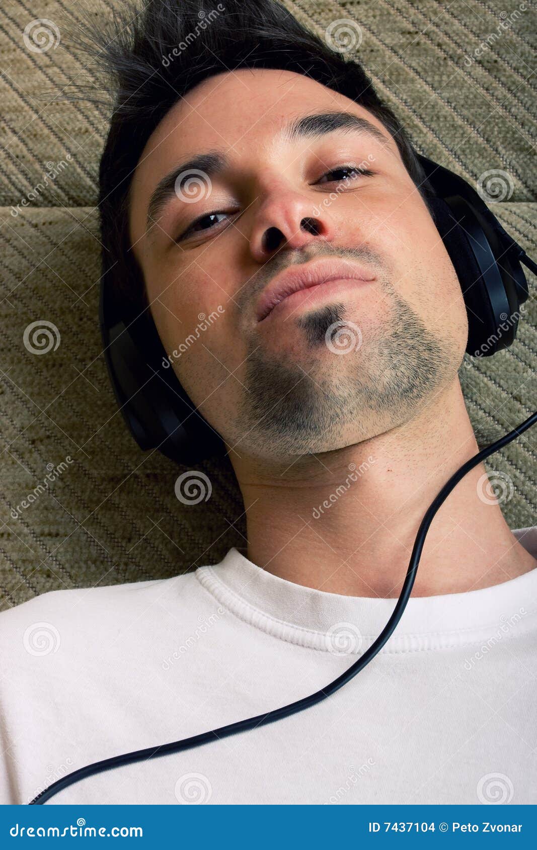 Young Man Enjoying Music stock photo. Image of expression - 7437104