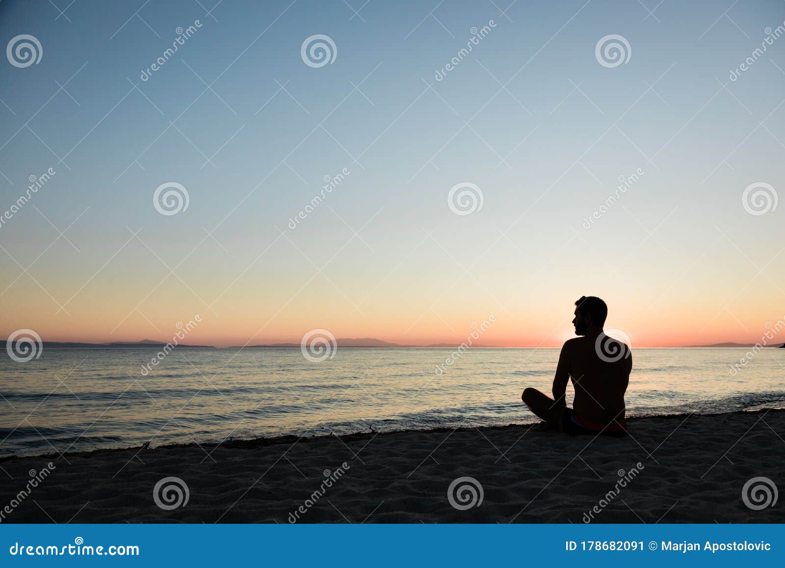 Young Man Enjoying Sunset on the Beach Stock Image - Image of adult ...