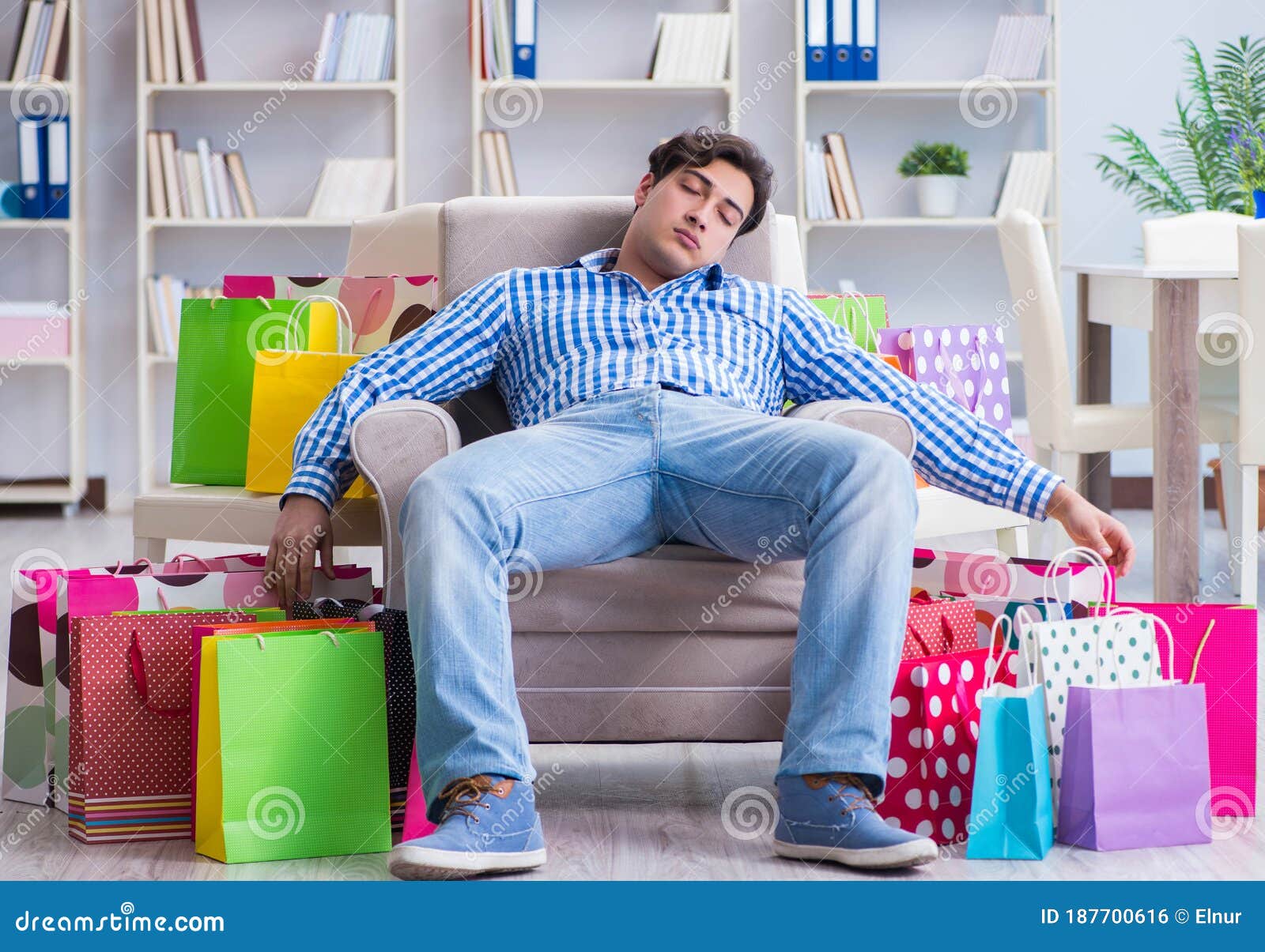 Young Man after Excessive Shopping at Home Stock Photo - Image of ...