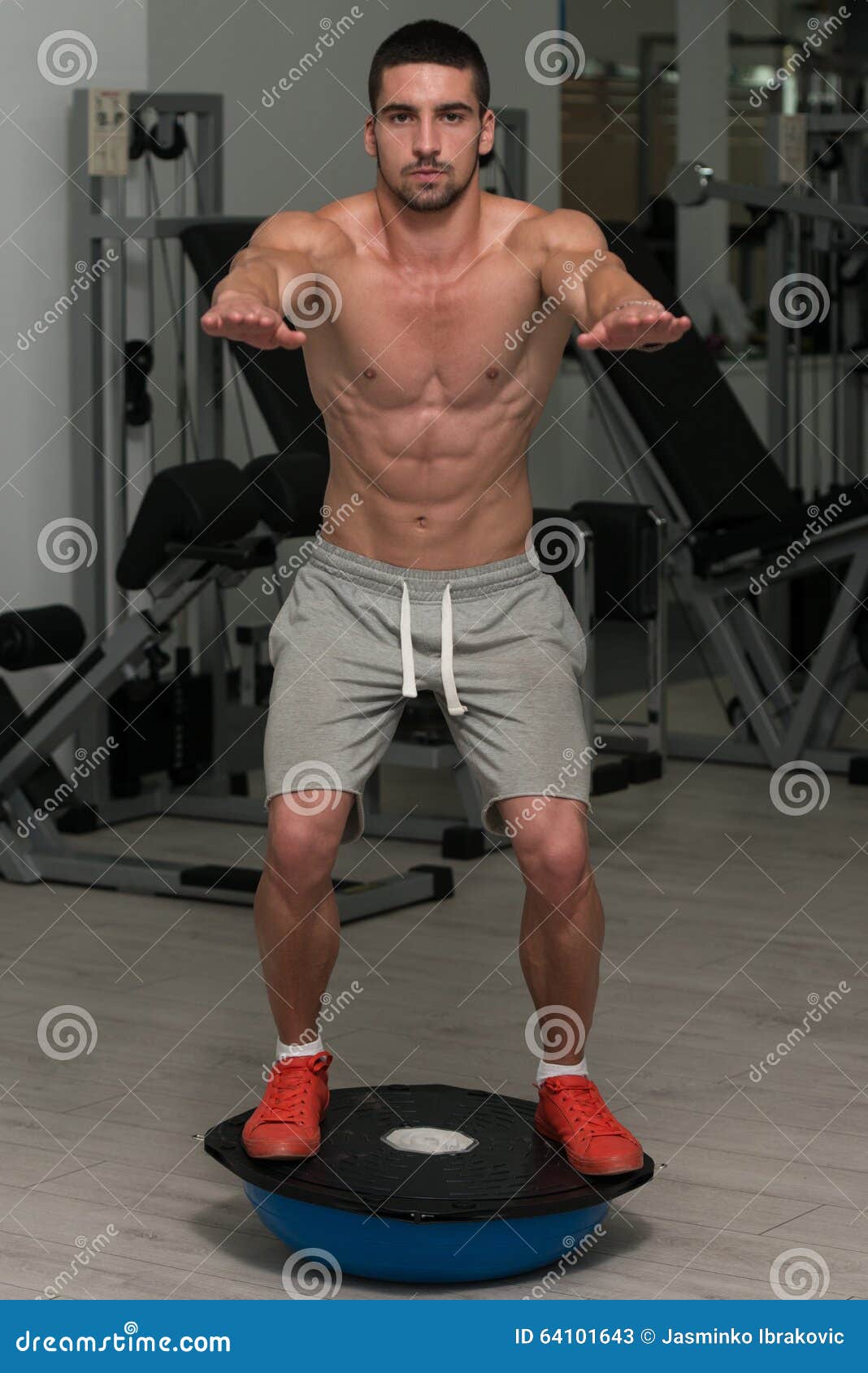Young Man Exercising - Bosu Balance Ball Stock Image - Image of body ...