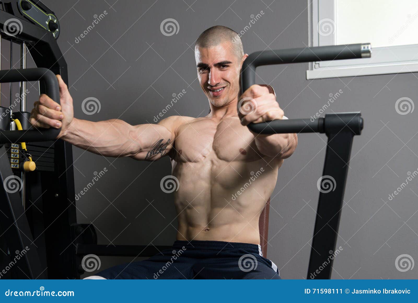 Young Man Exercising Chest in the Gym Stock Image - Image of picking ...