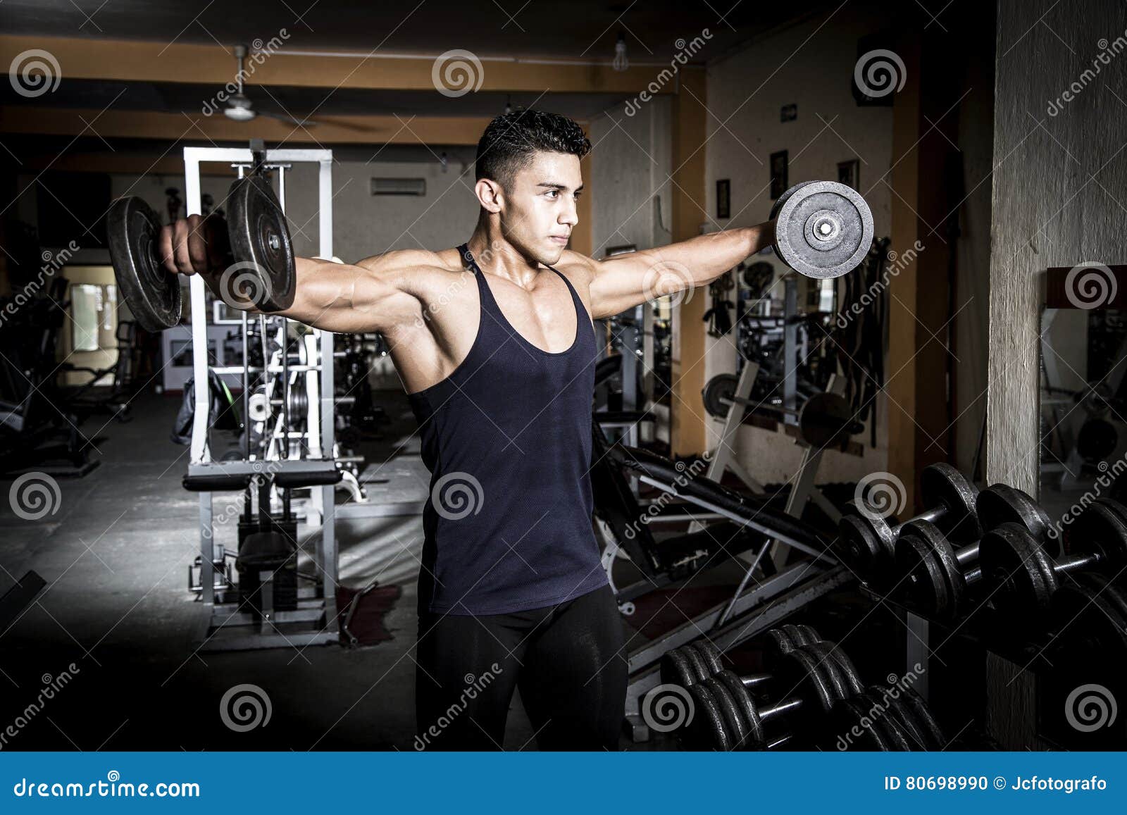 Young man exercising stock photo. Image of muscular, human - 80698990