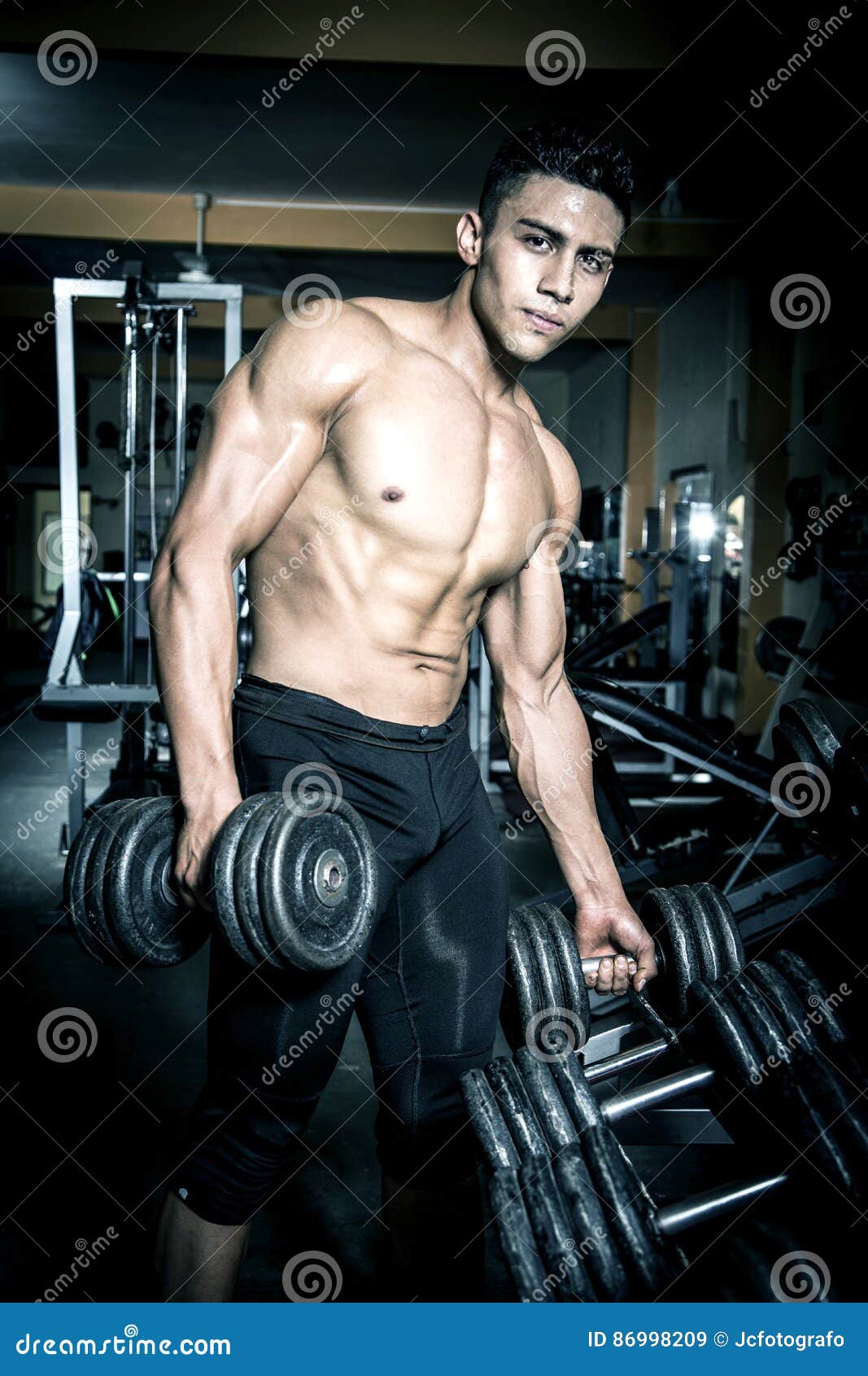 Young man exercising stock image. Image of balance, background - 86998209