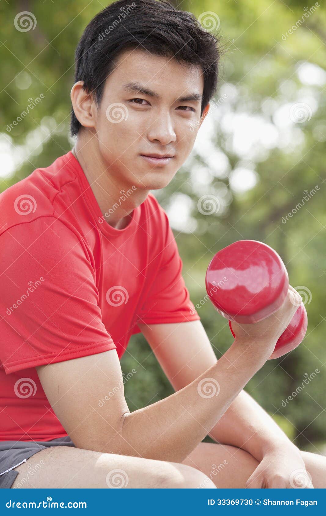 Young Man Exercising with Dumbbell Stock Photo - Image of dumbbell ...