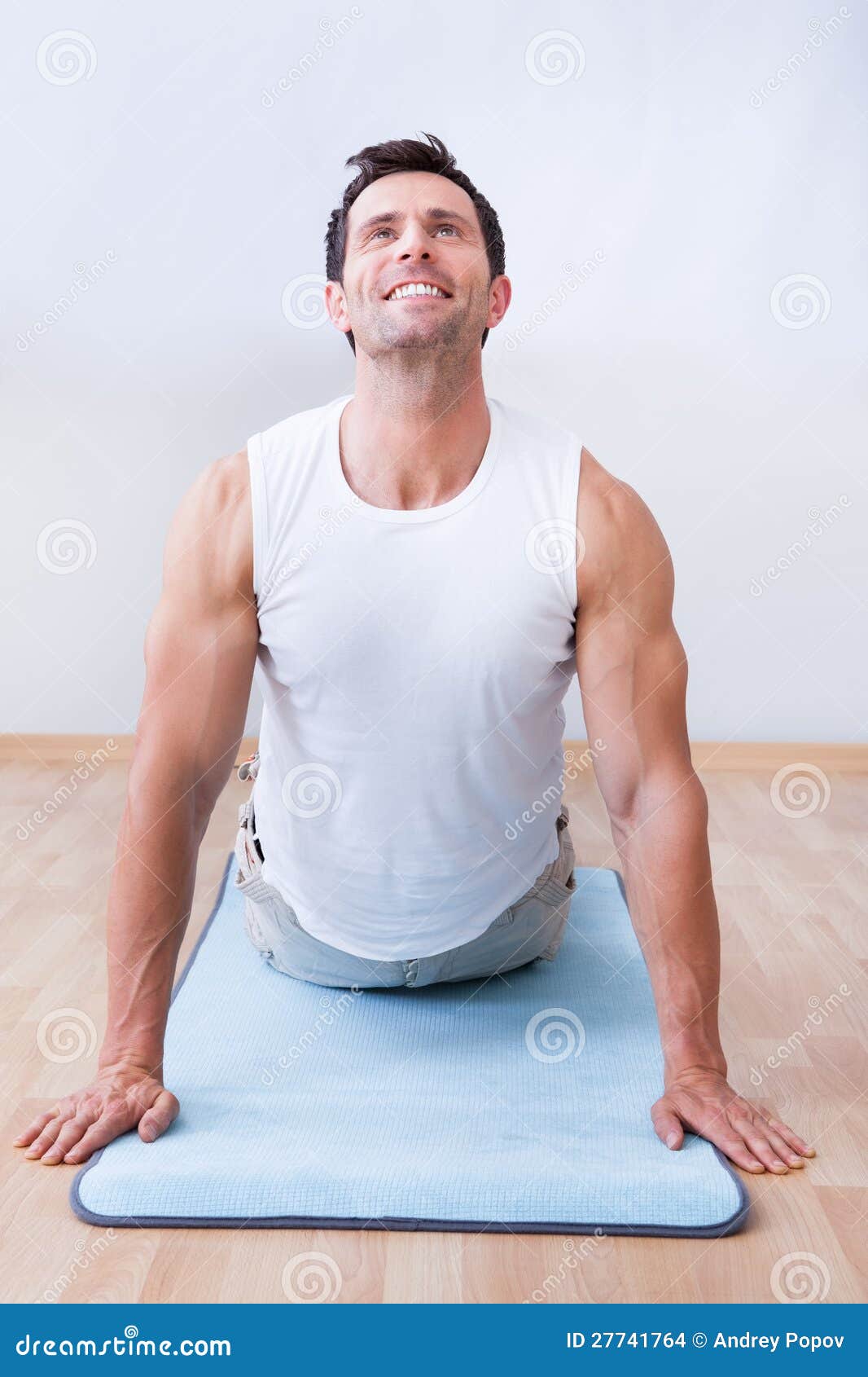 Young Man Exercising on Exercise Mat Stock Photo - Image of people ...