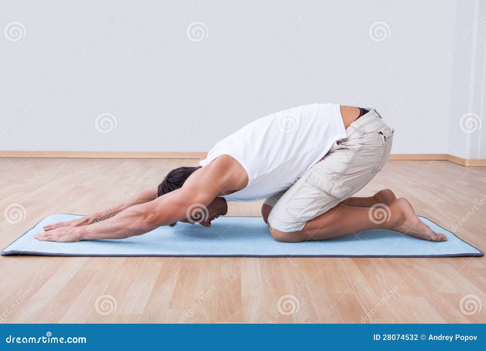 Young Man Exercising on Exercise Mat Stock Photo - Image of adult ...