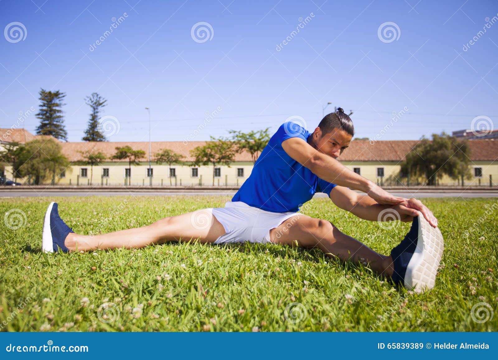 Young man exercising stock image. Image of green, health - 65839389
