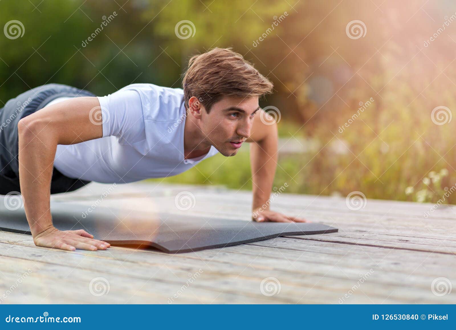 Young Man Exercising Outdoors Stock Photo - Image of handsome, athlete ...