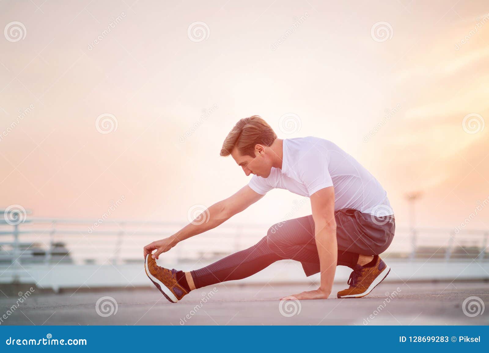 Young Man Exercising Outdoors Stock Image - Image of clothes, flexible ...