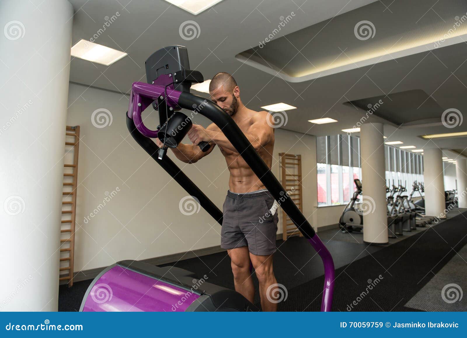Young Man Exercising on a Stepper Stock Image - Image of diet, athlete ...
