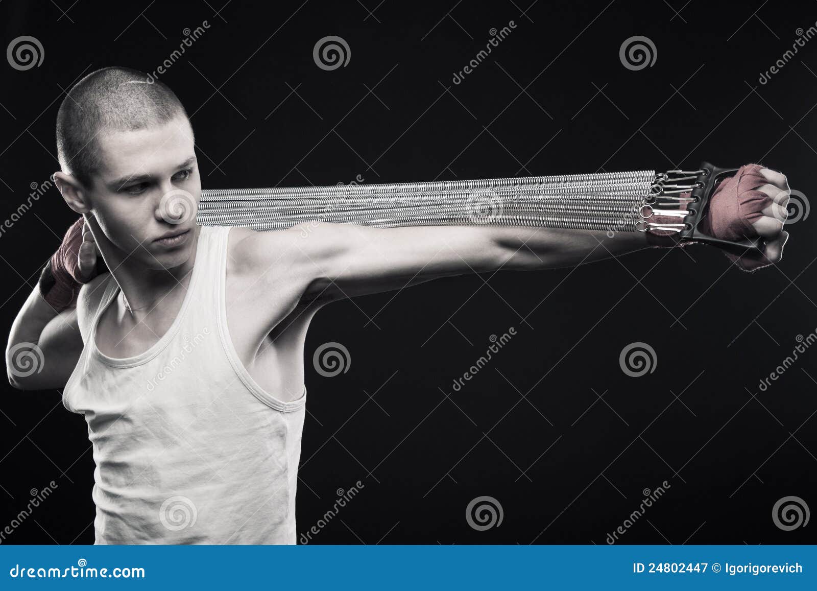 Young man with expander stock image. Image of male, athletic - 24802447