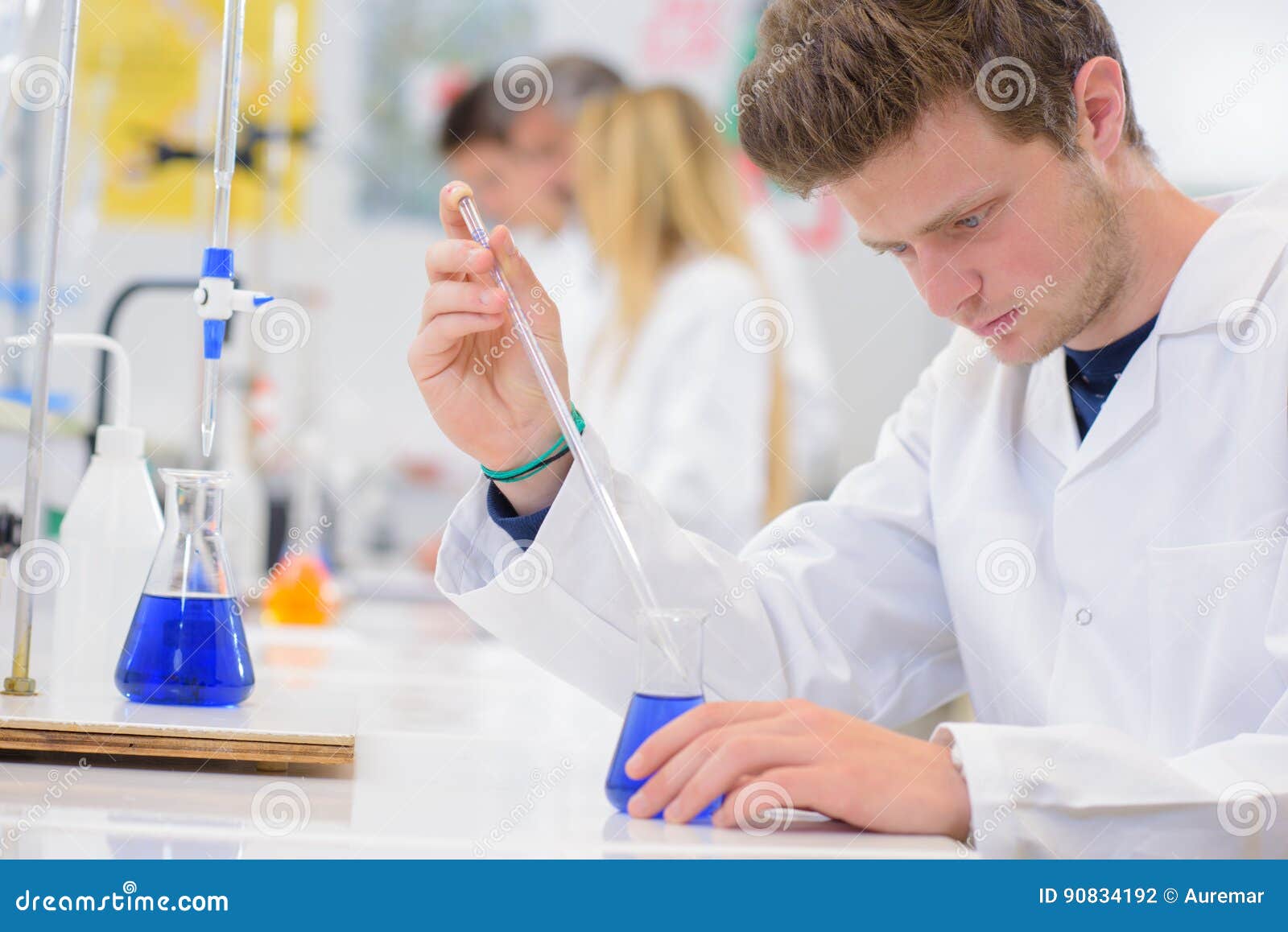 Young Man Experimenting in Lab Stock Photo - Image of explore, atom ...