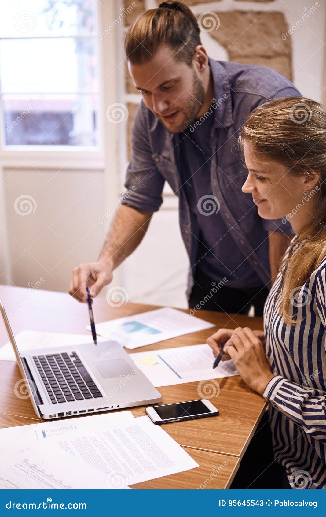 Young Man Explaing To Professional Lady Stock Image - Image of casual ...