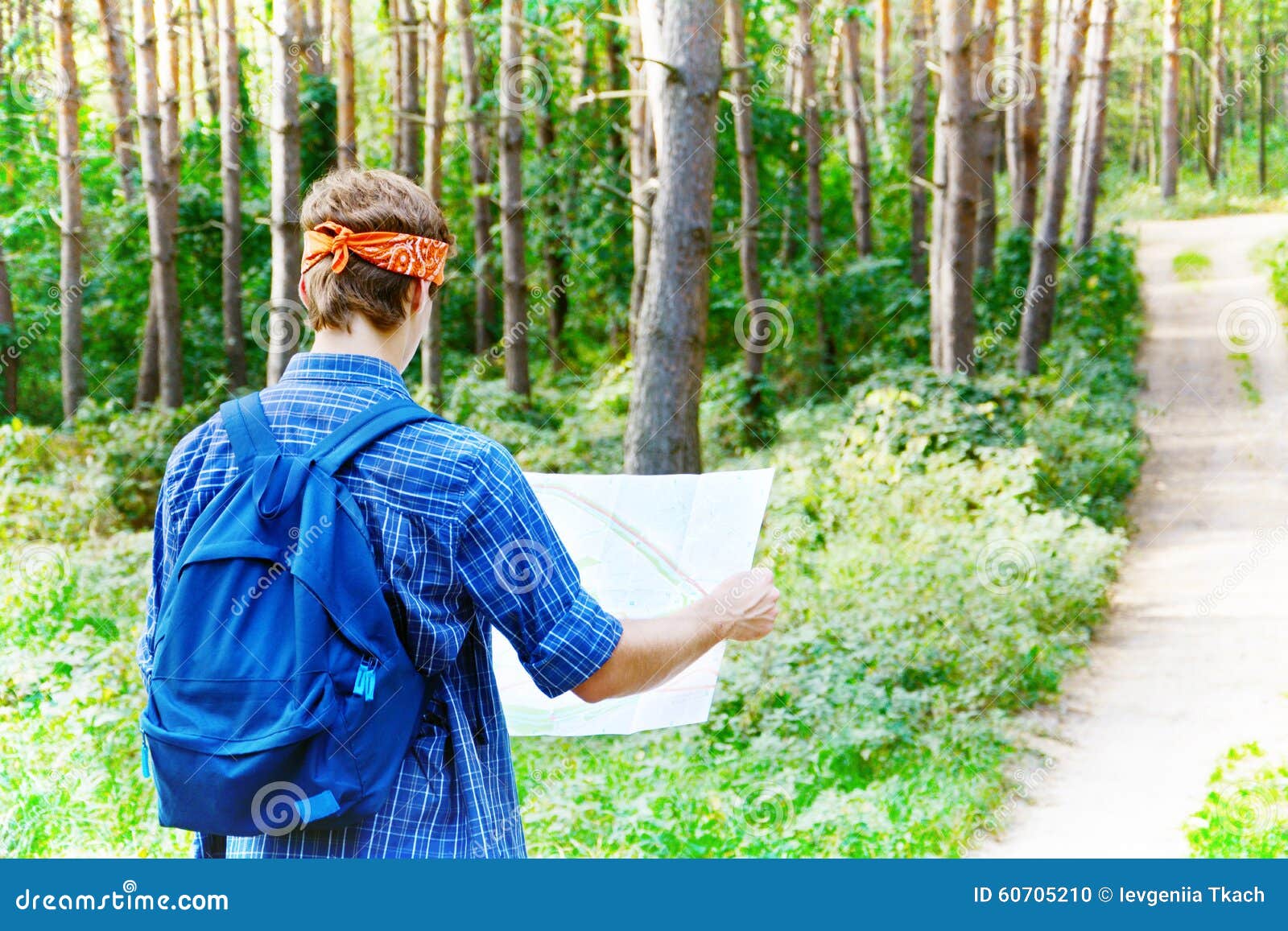 Young Man is Exploring the Map Stock Photo - Image of adventure, males ...
