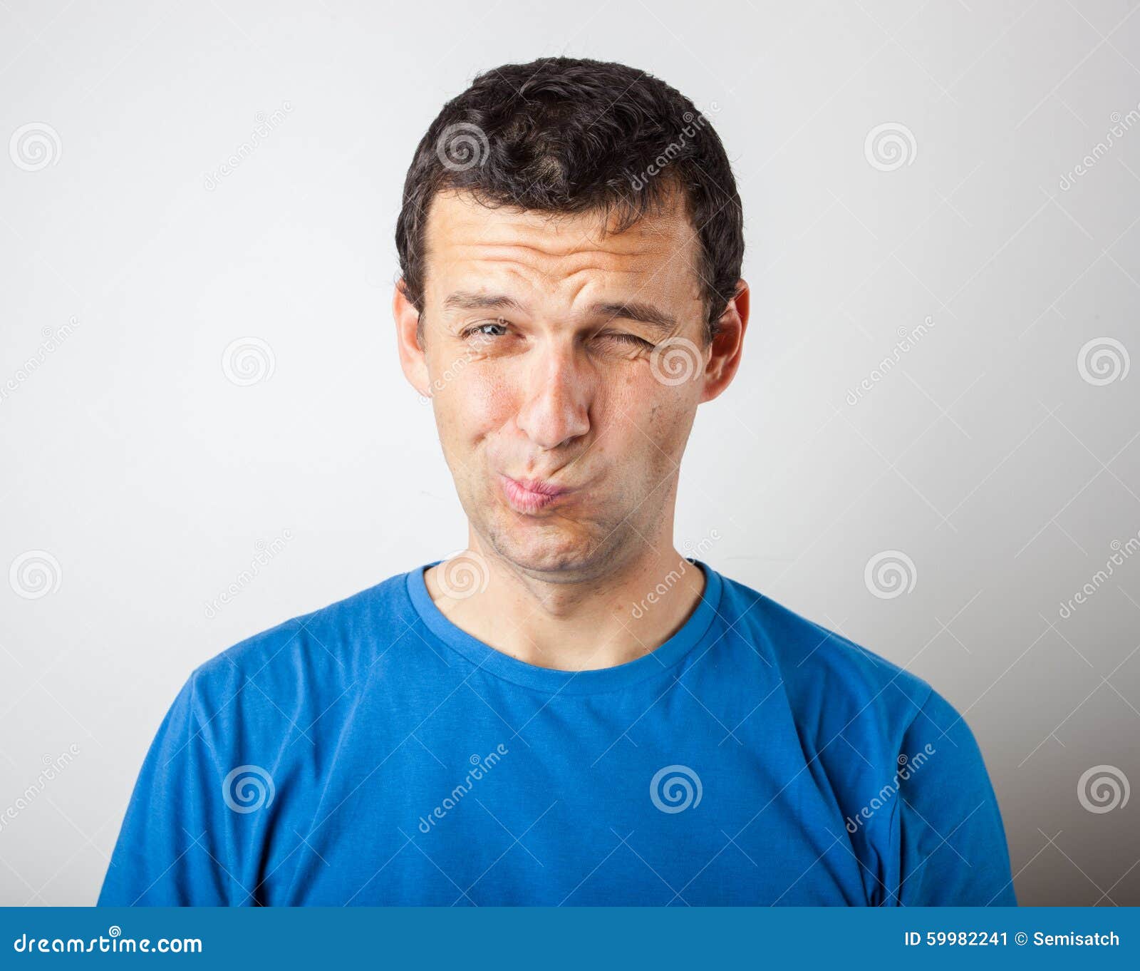 Young Man Expressing Emotions Stock Image - Image of happy, adult: 59982241