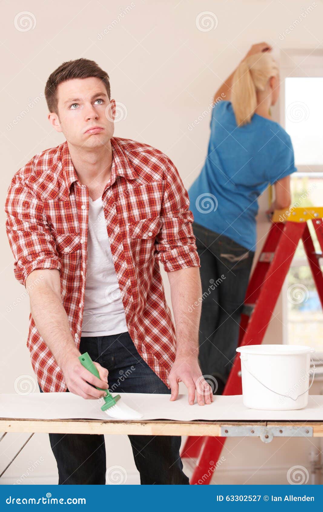 Young Man Fed Up with Decorating Home Stock Image - Image of measuring ...