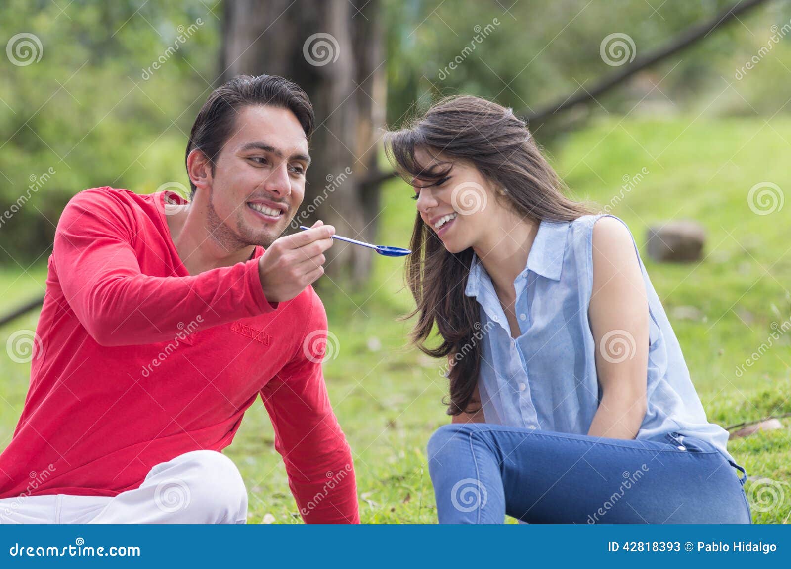 Young Man Feeding Girlfriend with a Spoon Stock Image - Image of joyful ...
