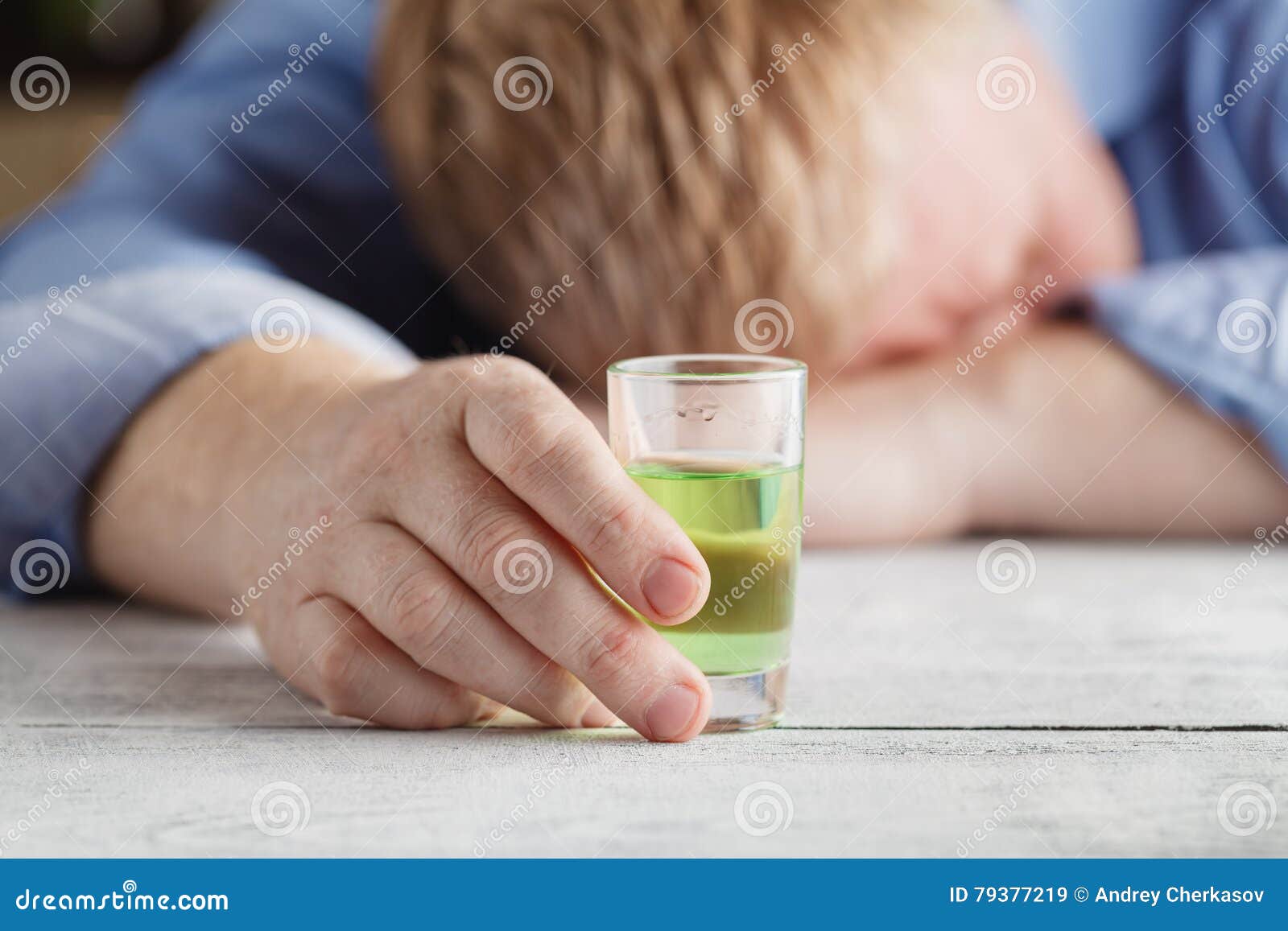 Young Man Feeling Alone and Drinking Too Much Alcohol in His Own Stock ...