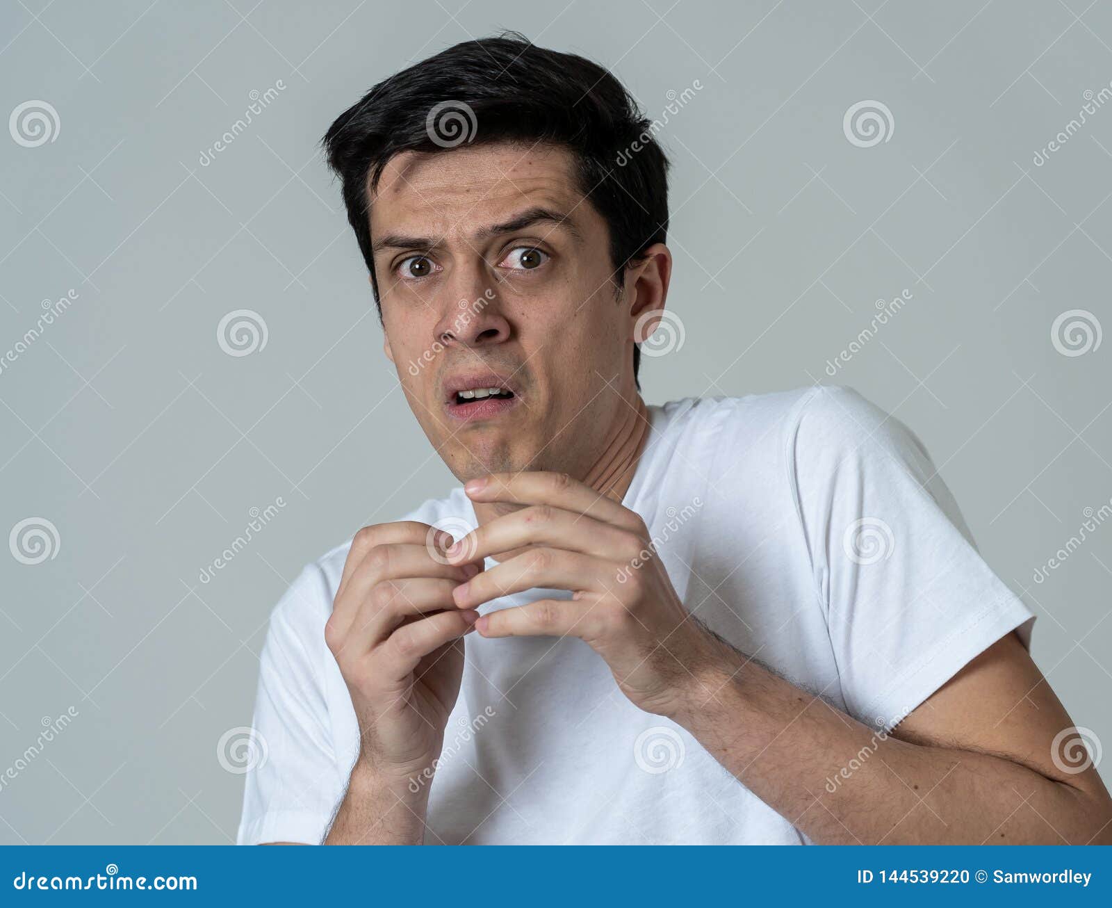 Portrait Of A Young Man Looking Scared And Shocked Human Expressions