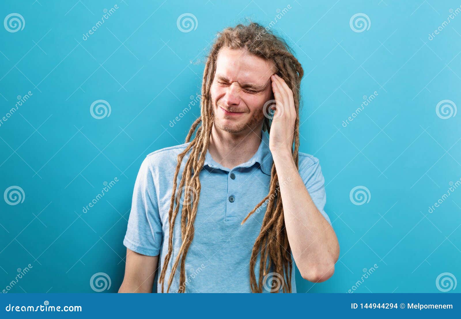 Young Man Feeling Stressed Out Stock Photo - Image of solid, blue ...