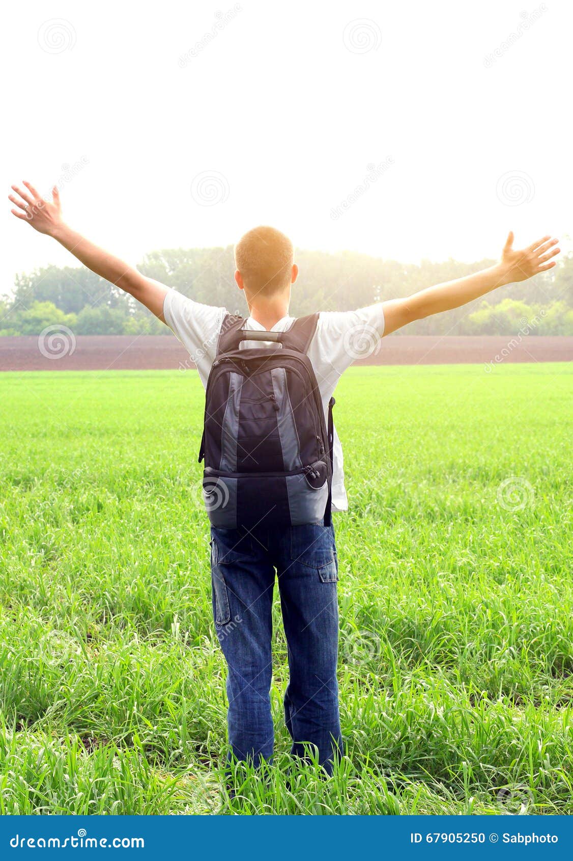 Young Man in the Field stock photo. Image of field, spread - 67905250