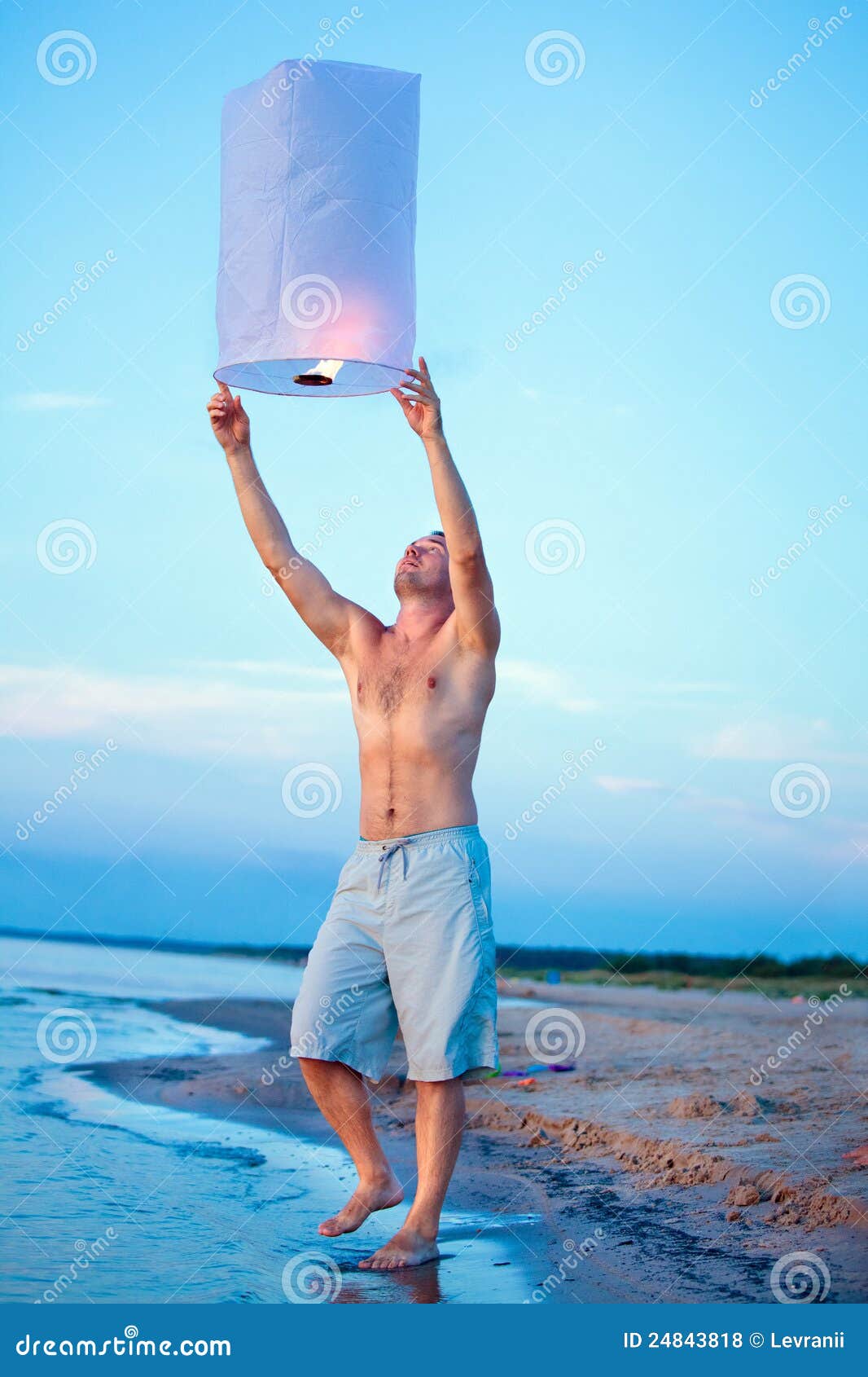 A Young Man with a Fire Lantern Stock Photo - Image of person, ceremony ...