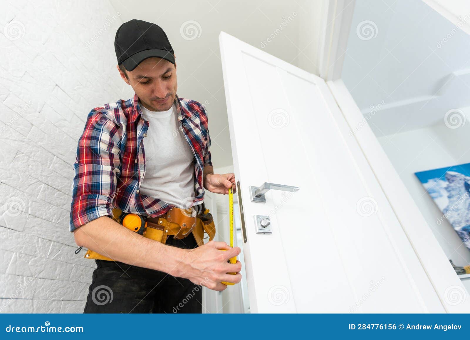 Young Man Fixing a Door Lock Stock Photo - Image of house, locksmith ...